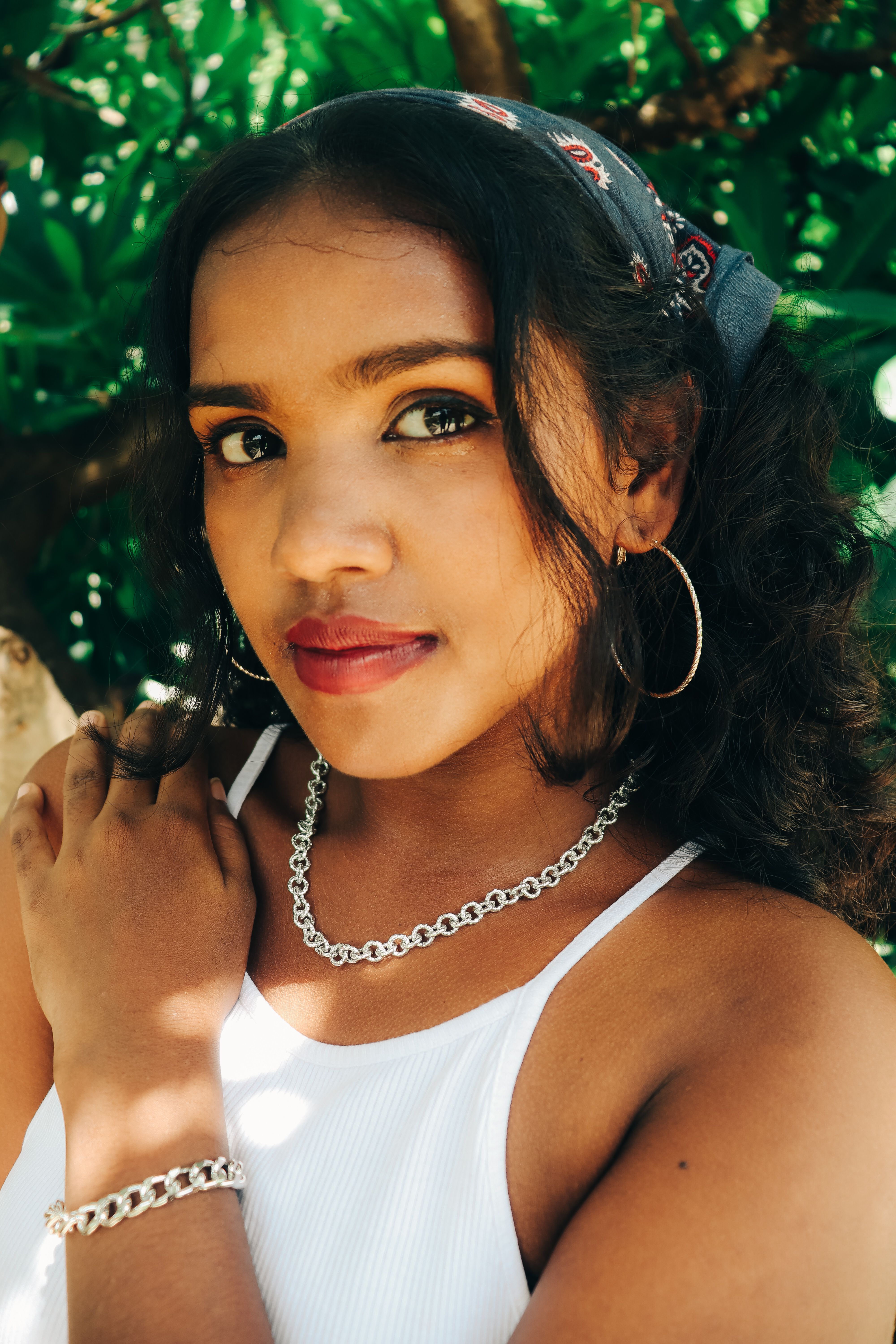 Young Brunette Woman Wearing a Chain Link Necklace and Bracelet · Free ...