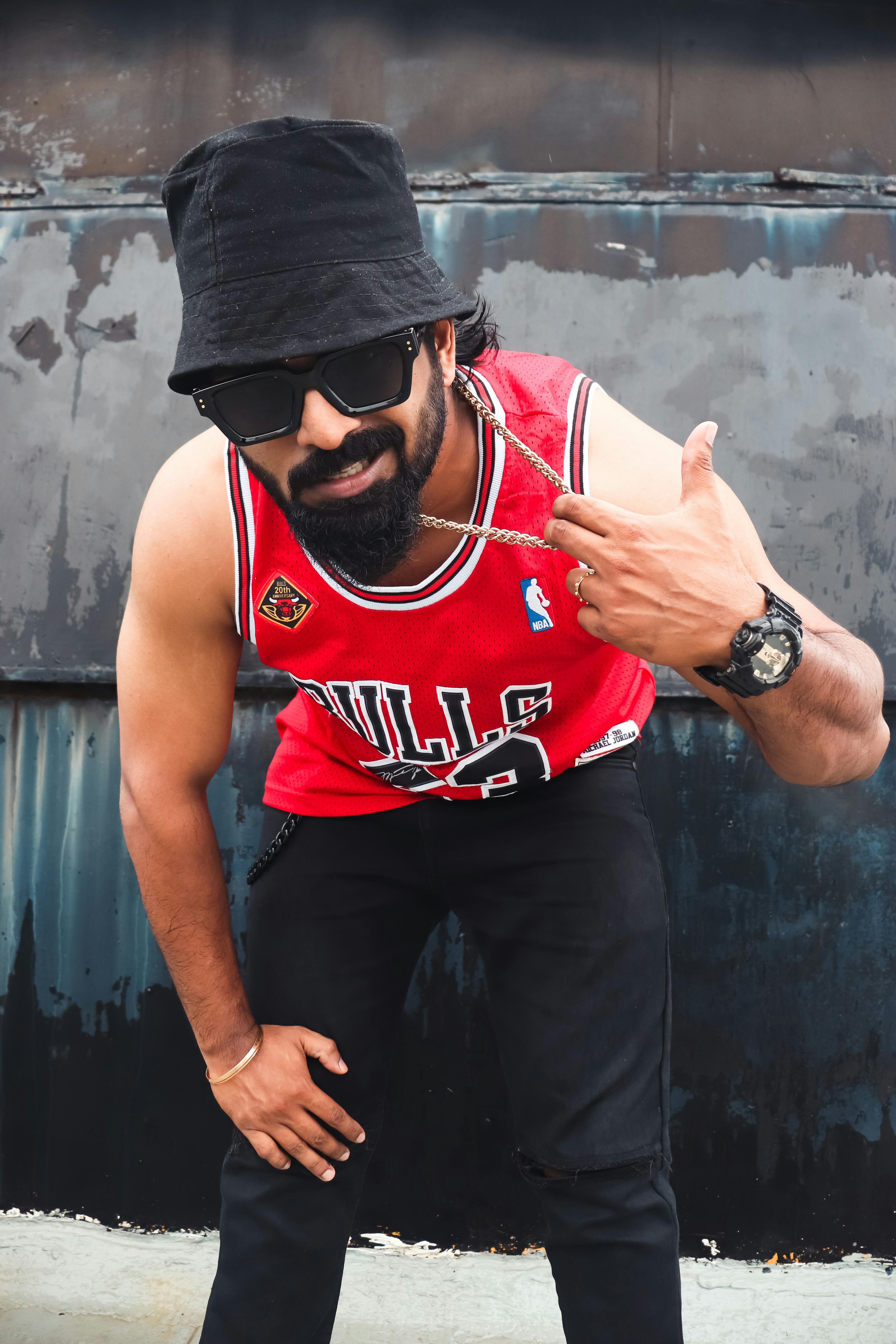 Bearded Brunette Man Posing in a Black Bucket Hat and Skinny Jeans ...