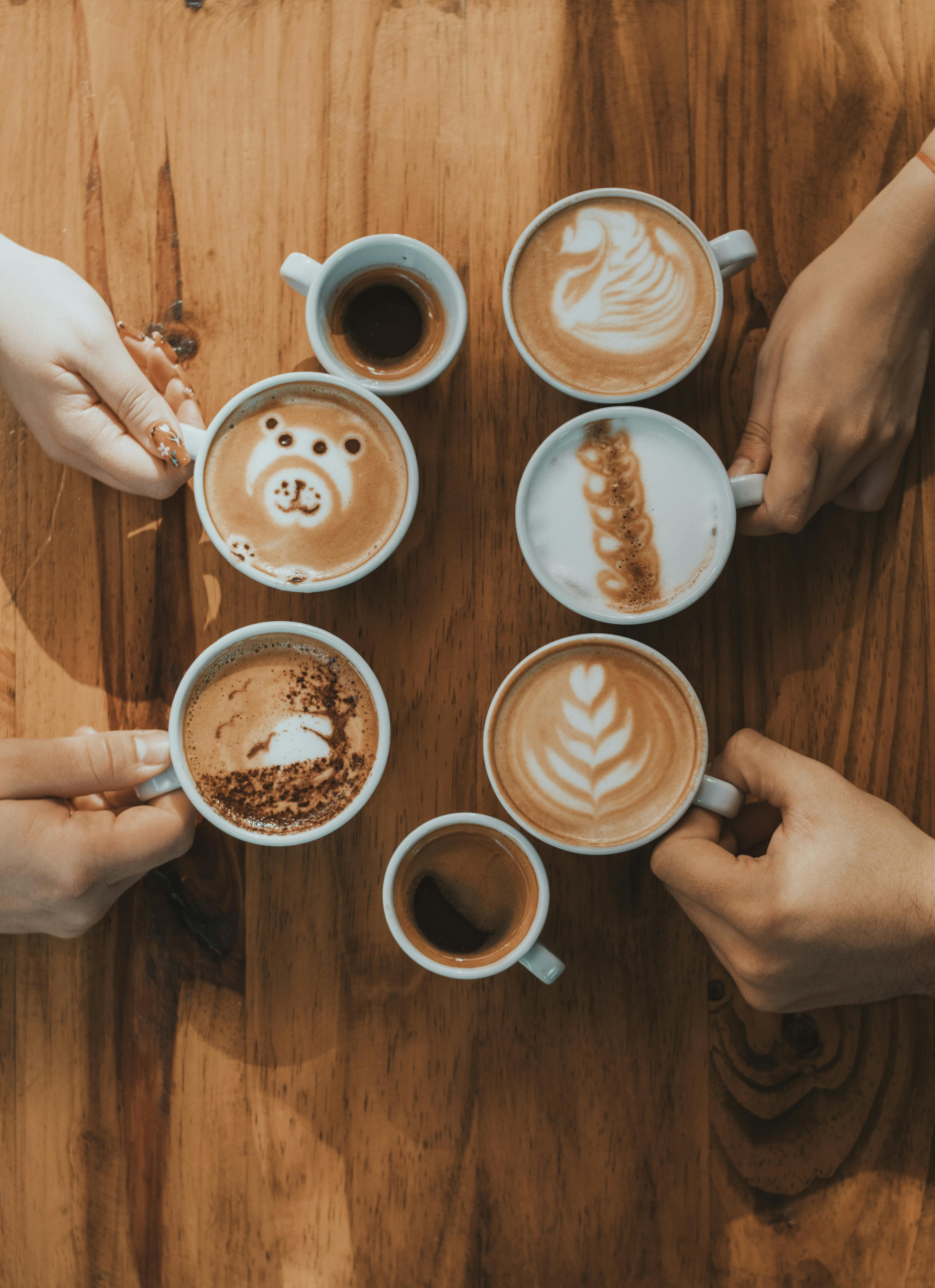 People Holding Mugs · Free Stock Photo