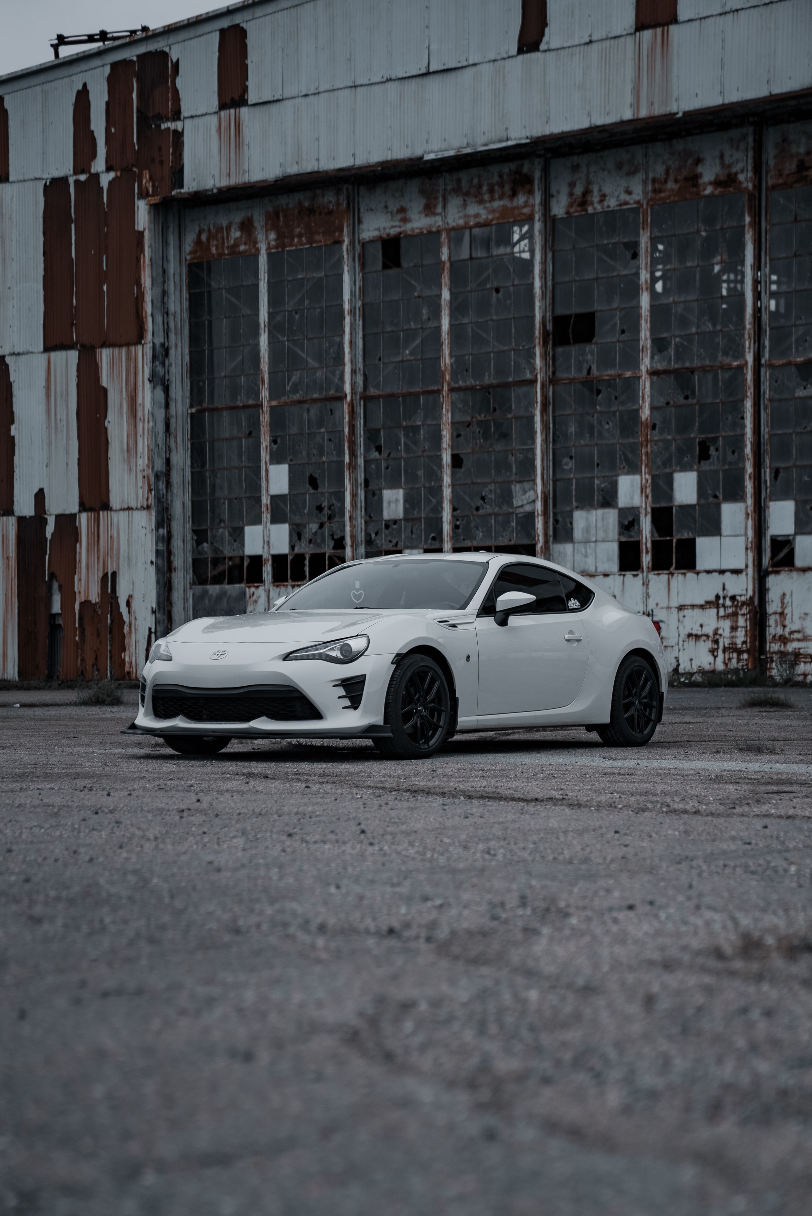Back of a Red Toyota GR86 on an Asphalt Road · Free Stock Photo
