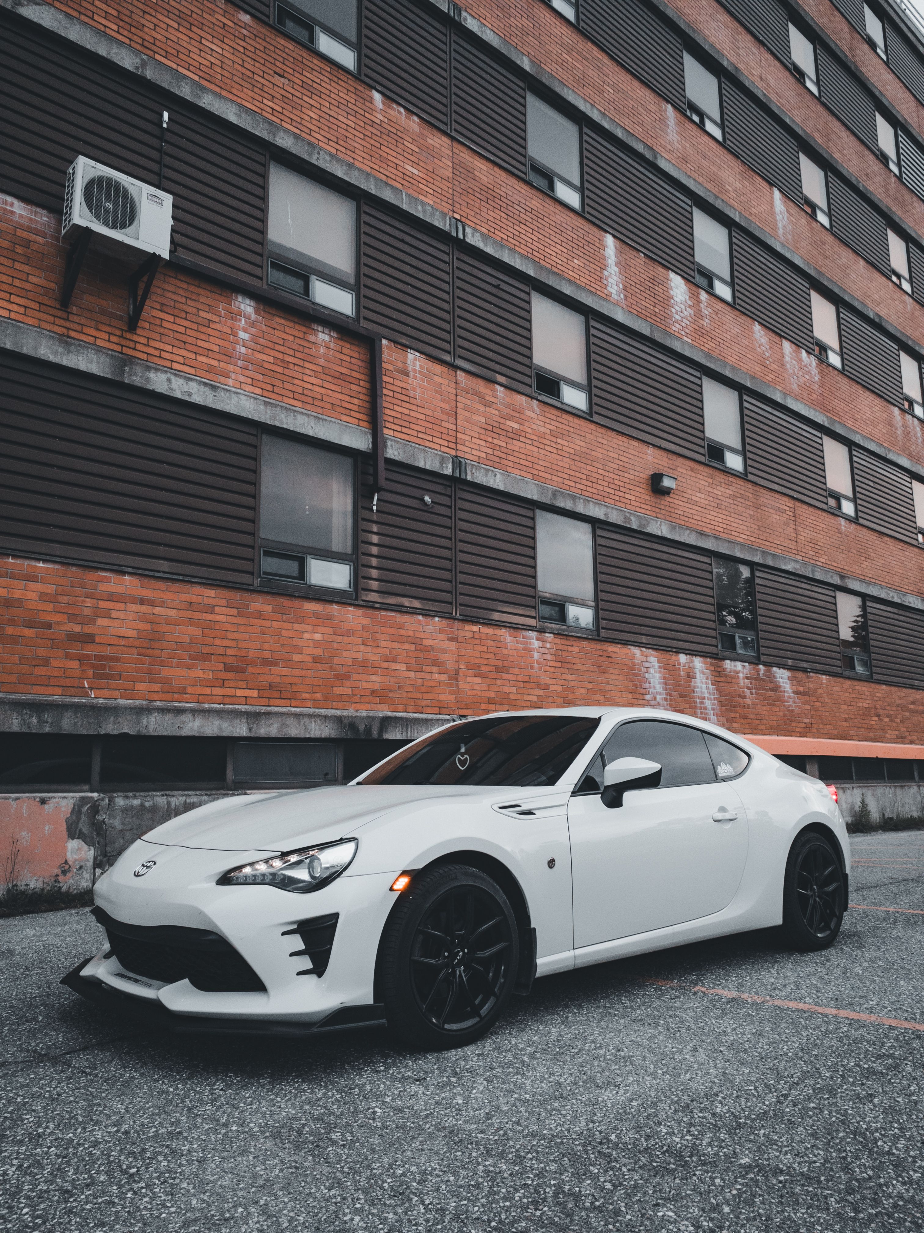 Back of a Red Toyota GR86 on an Asphalt Road · Free Stock Photo
