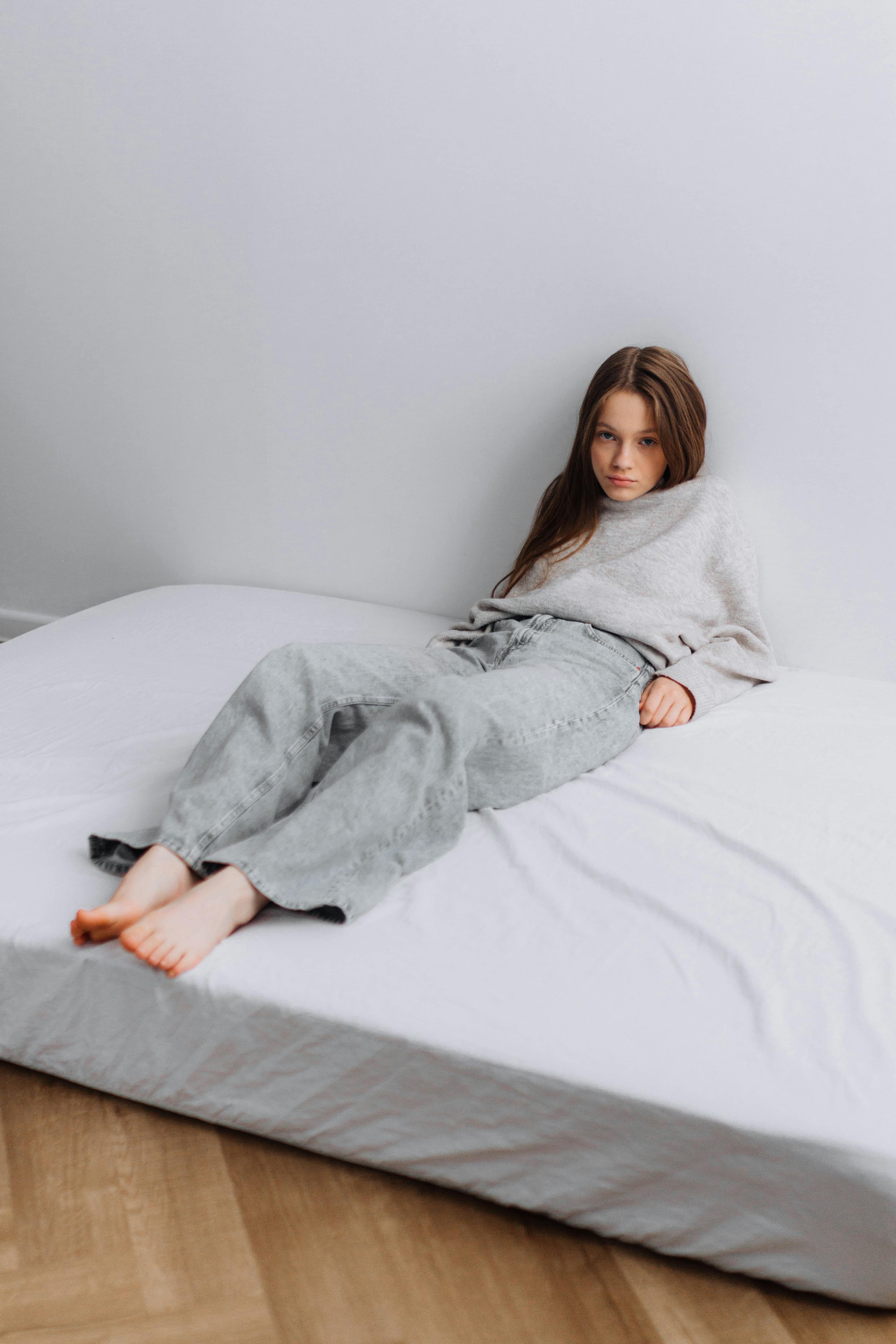 Woman Lying on Mattress · Free Stock Photo