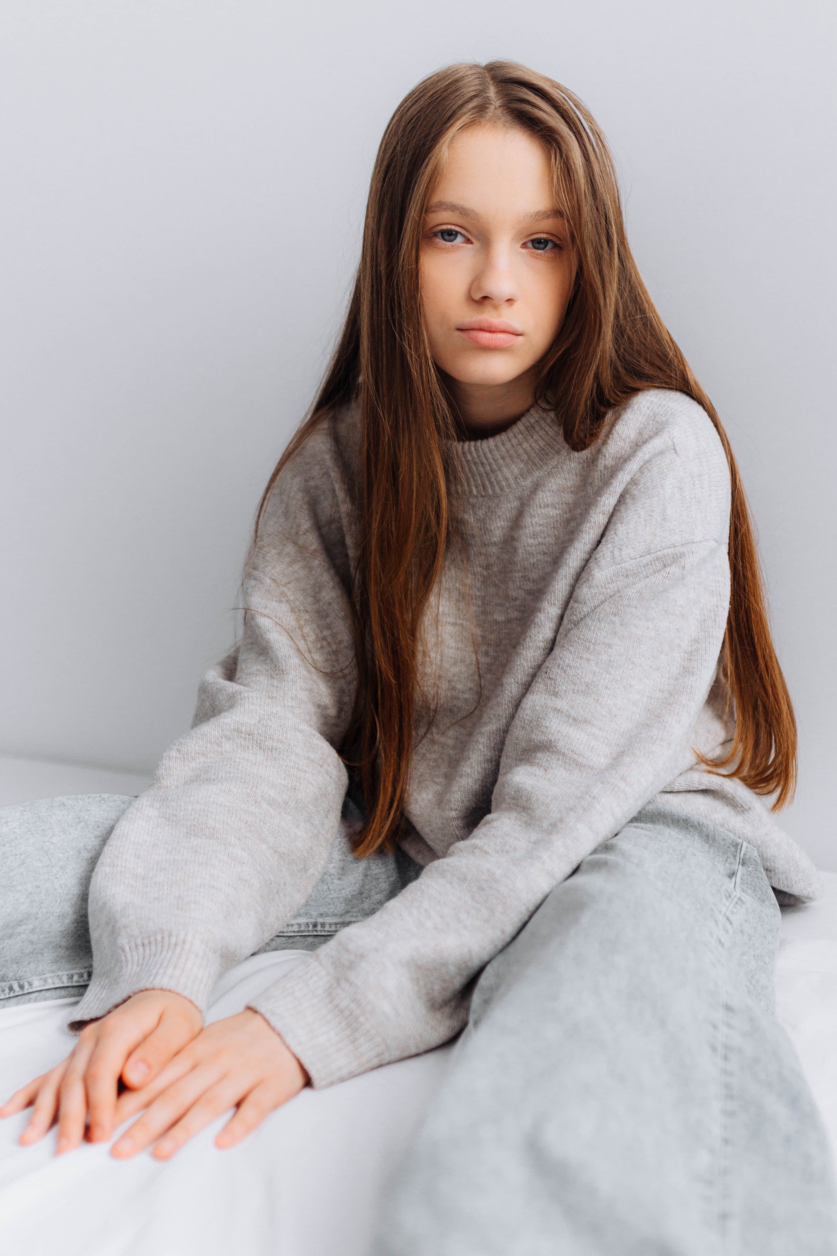 Woman Sitting On Mattress Free Stock Photo
