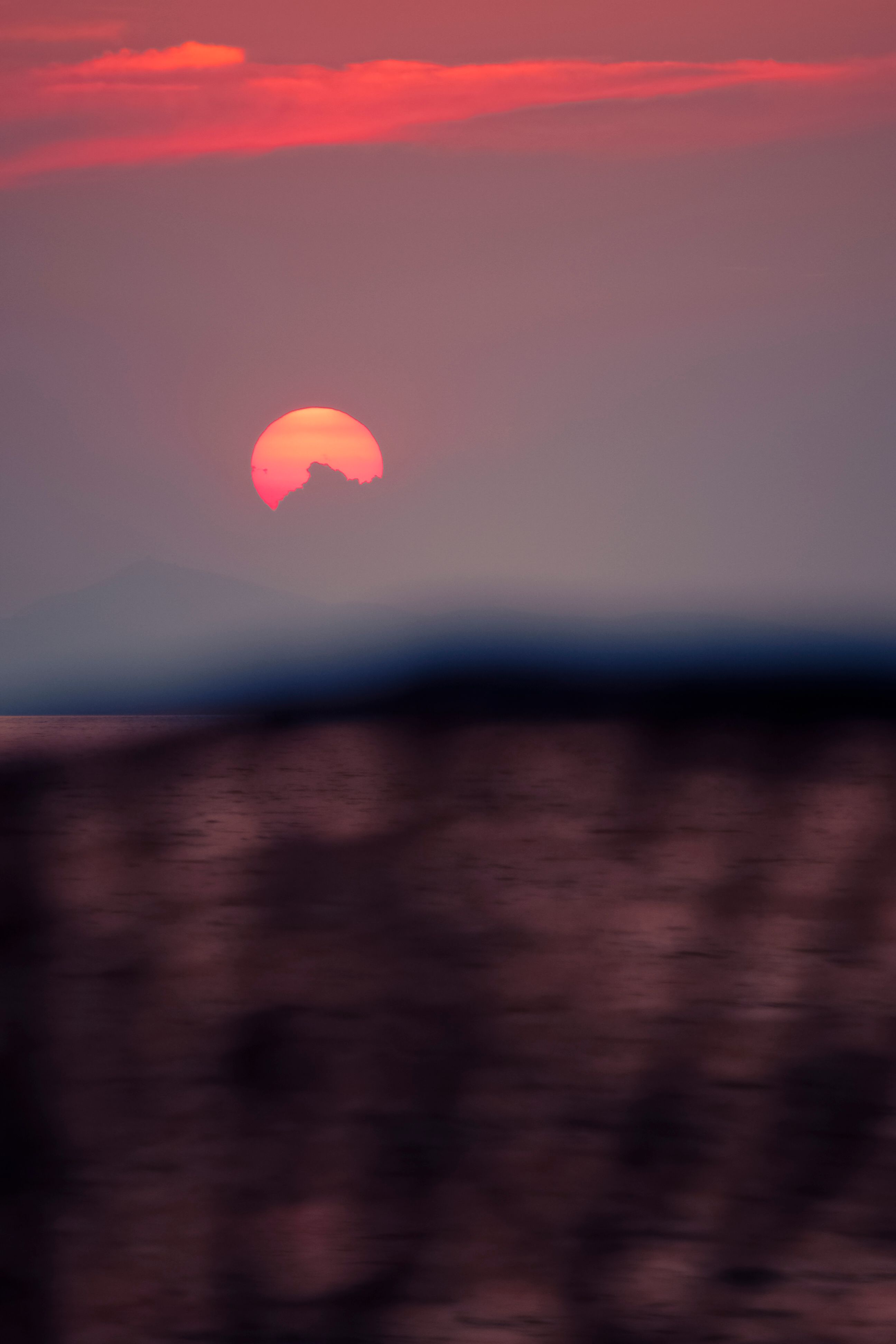 Sunset over Distant Hills · Free Stock Photo