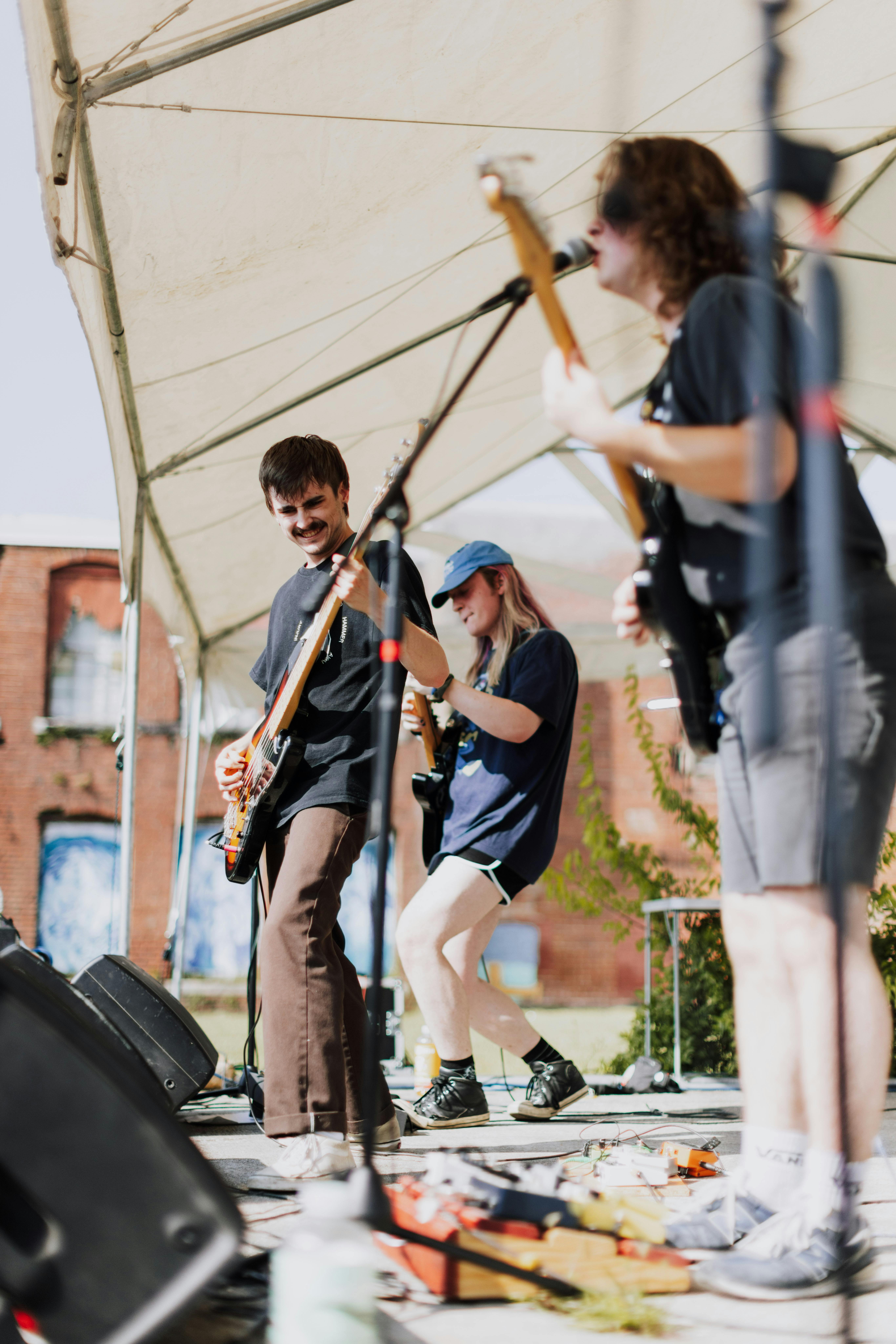 Musicians Playing on Stage · Free Stock Photo