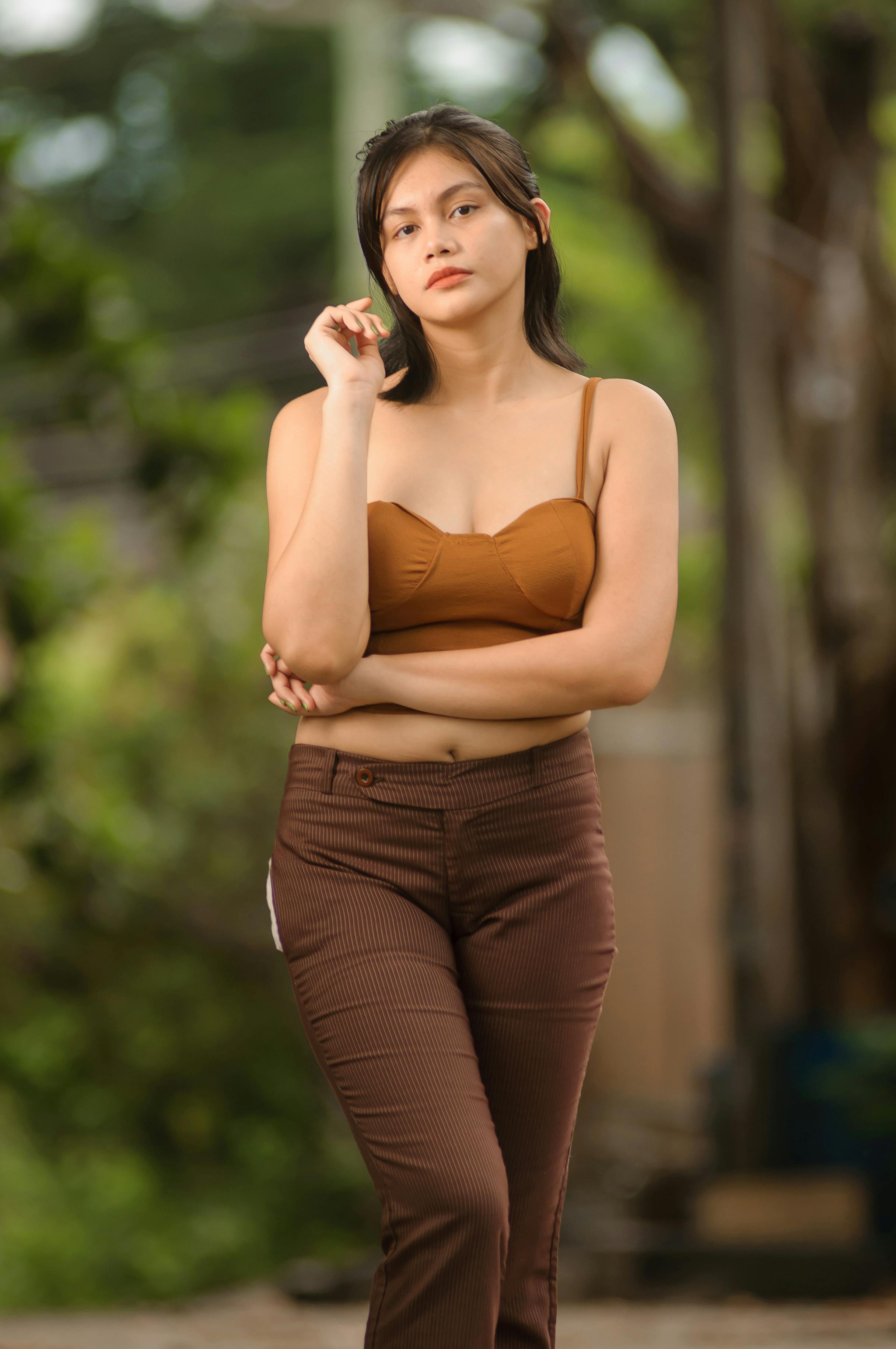 Woman Standing and Posing · Free Stock Photo