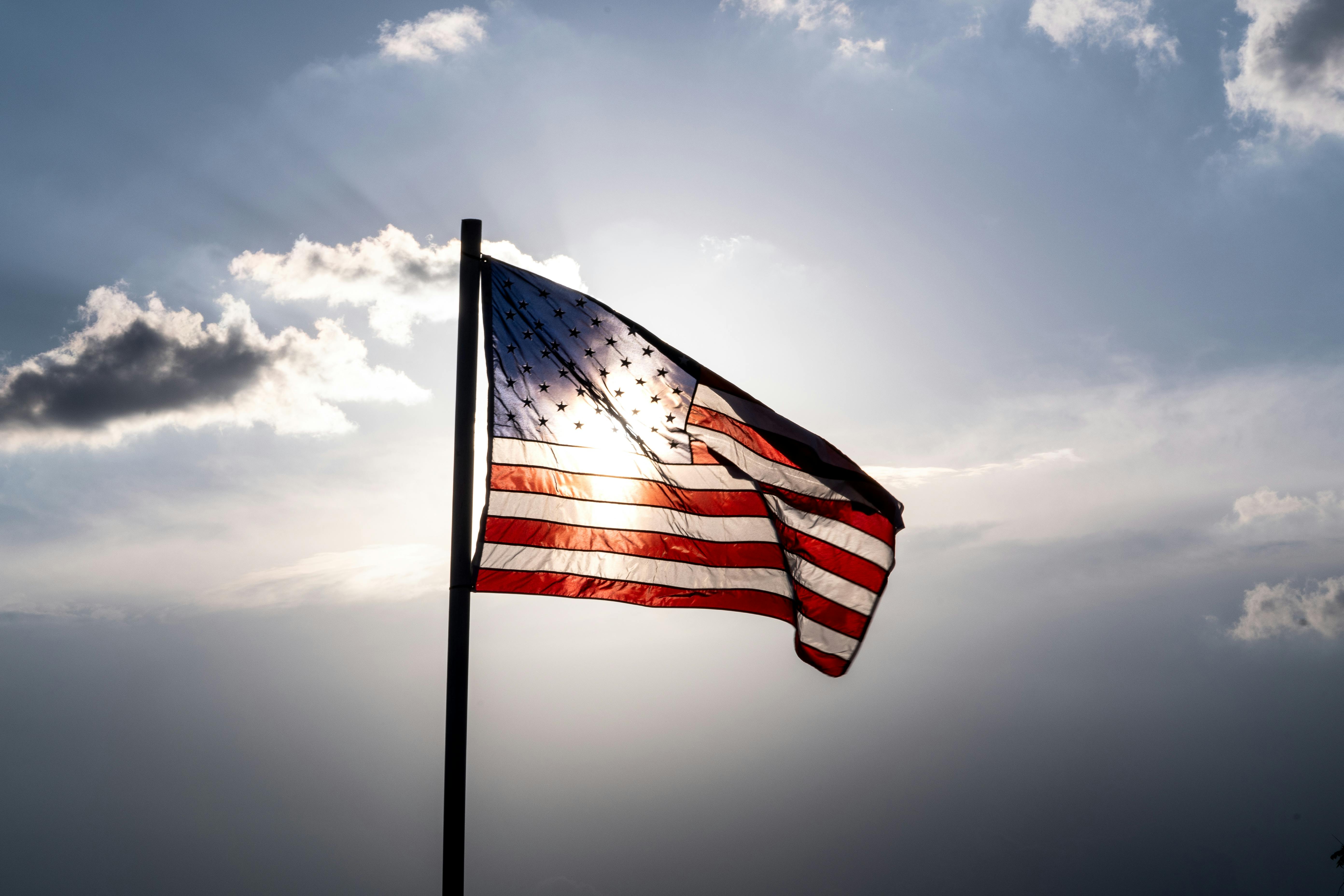 Sunset Sunlight over Flag of USA · Free Stock Photo