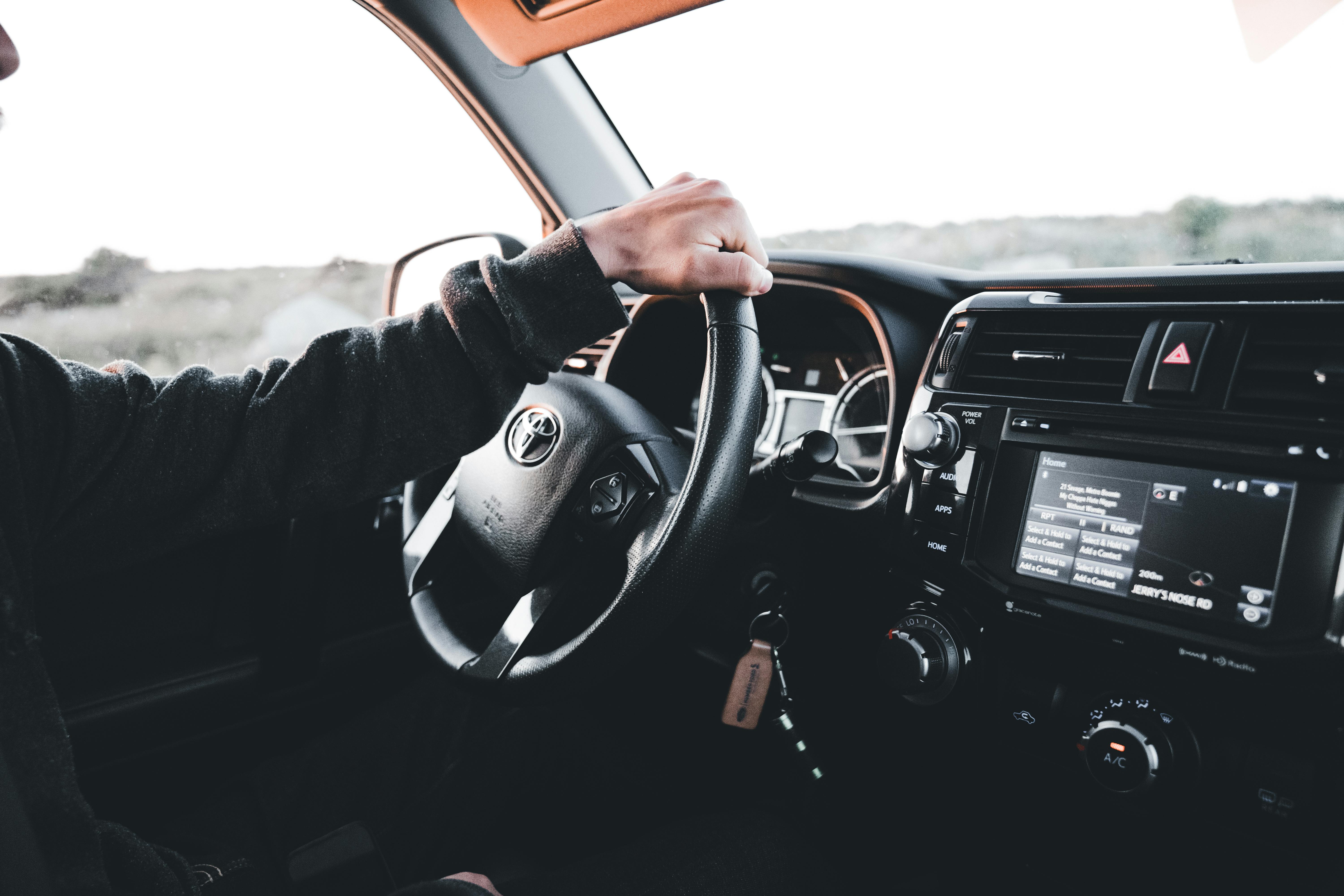 Person Driving BMW Car · Free Stock Photo