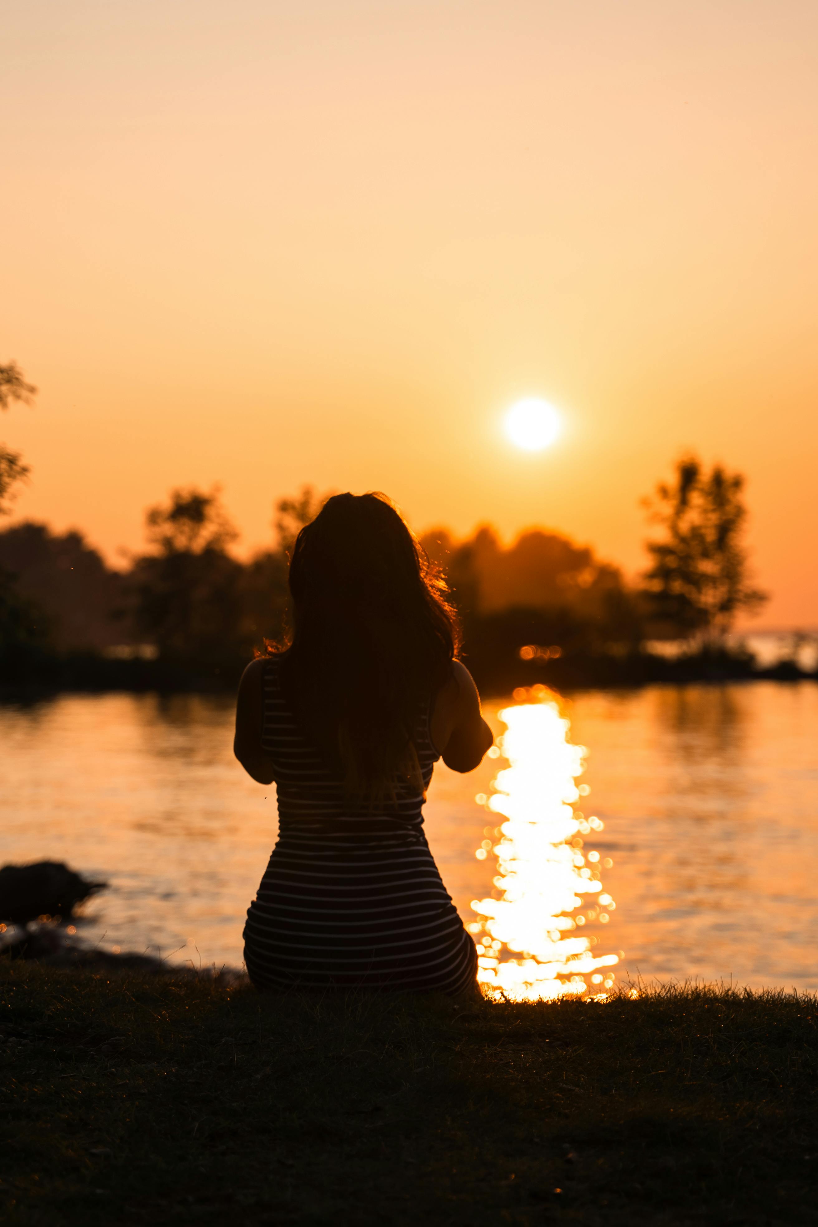 Woman Staring at Lake · Free Stock Photo