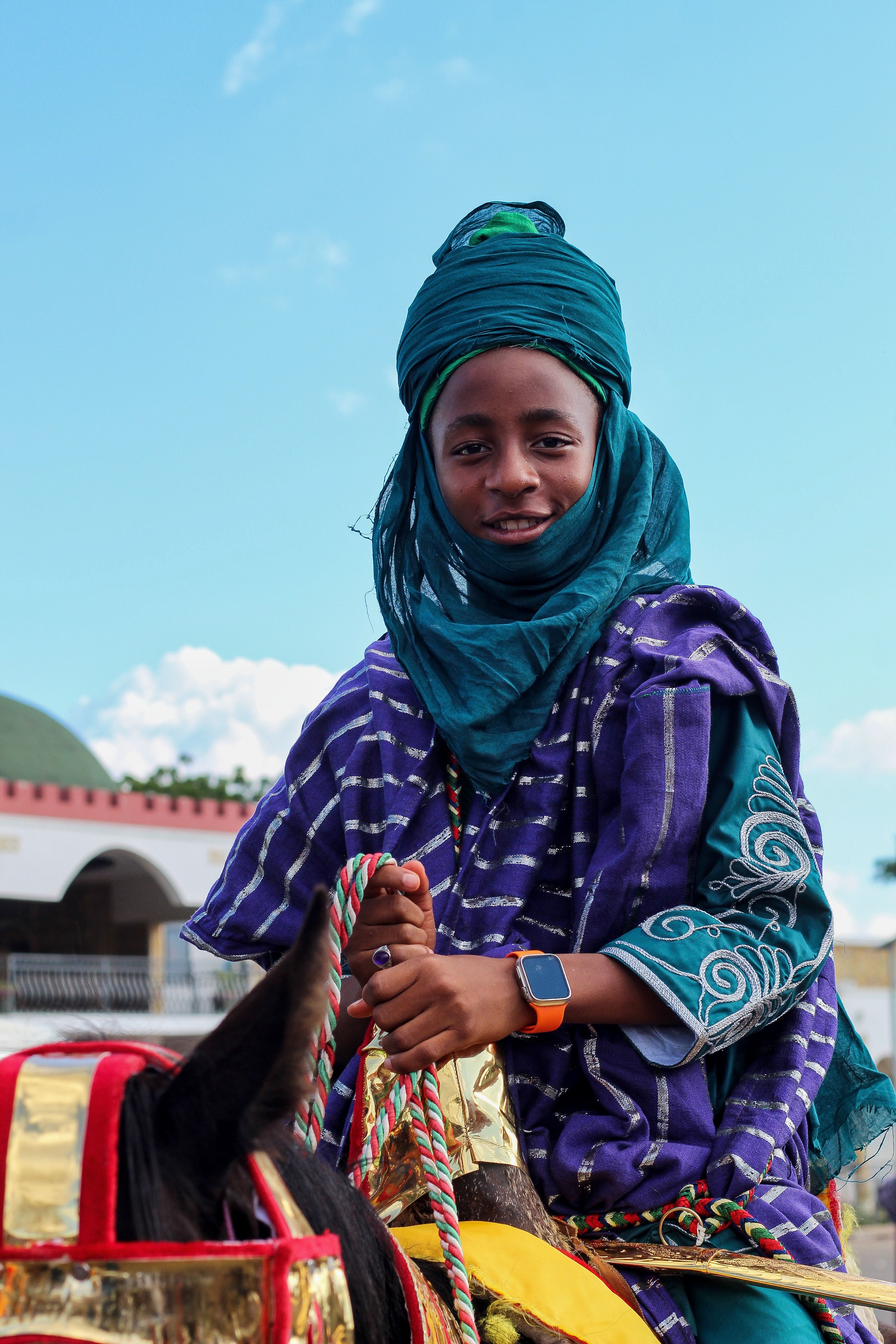 Smiling Nomad in Traditional Clothing · Free Stock Photo