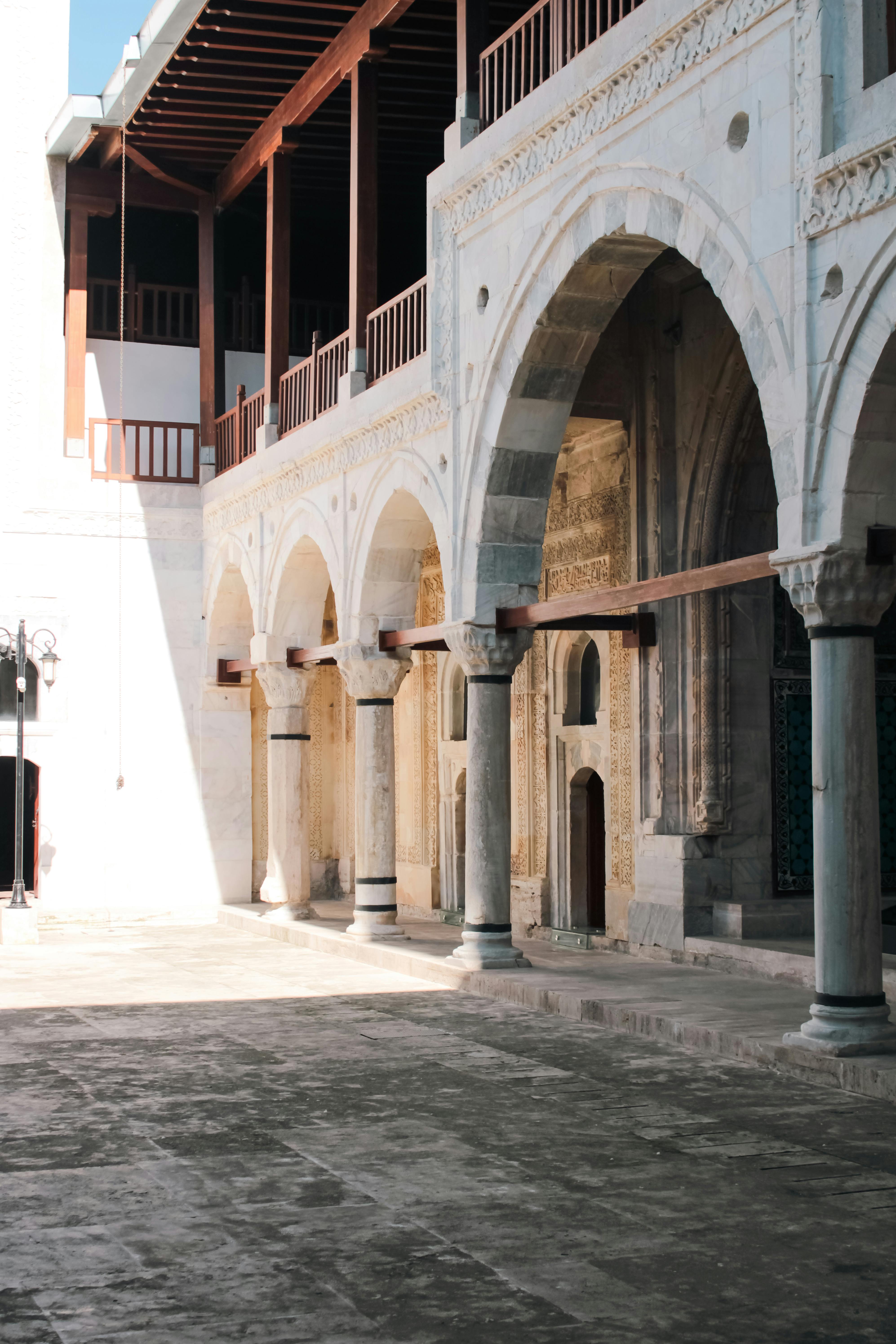 Building Columns on Courtyard · Free Stock Photo