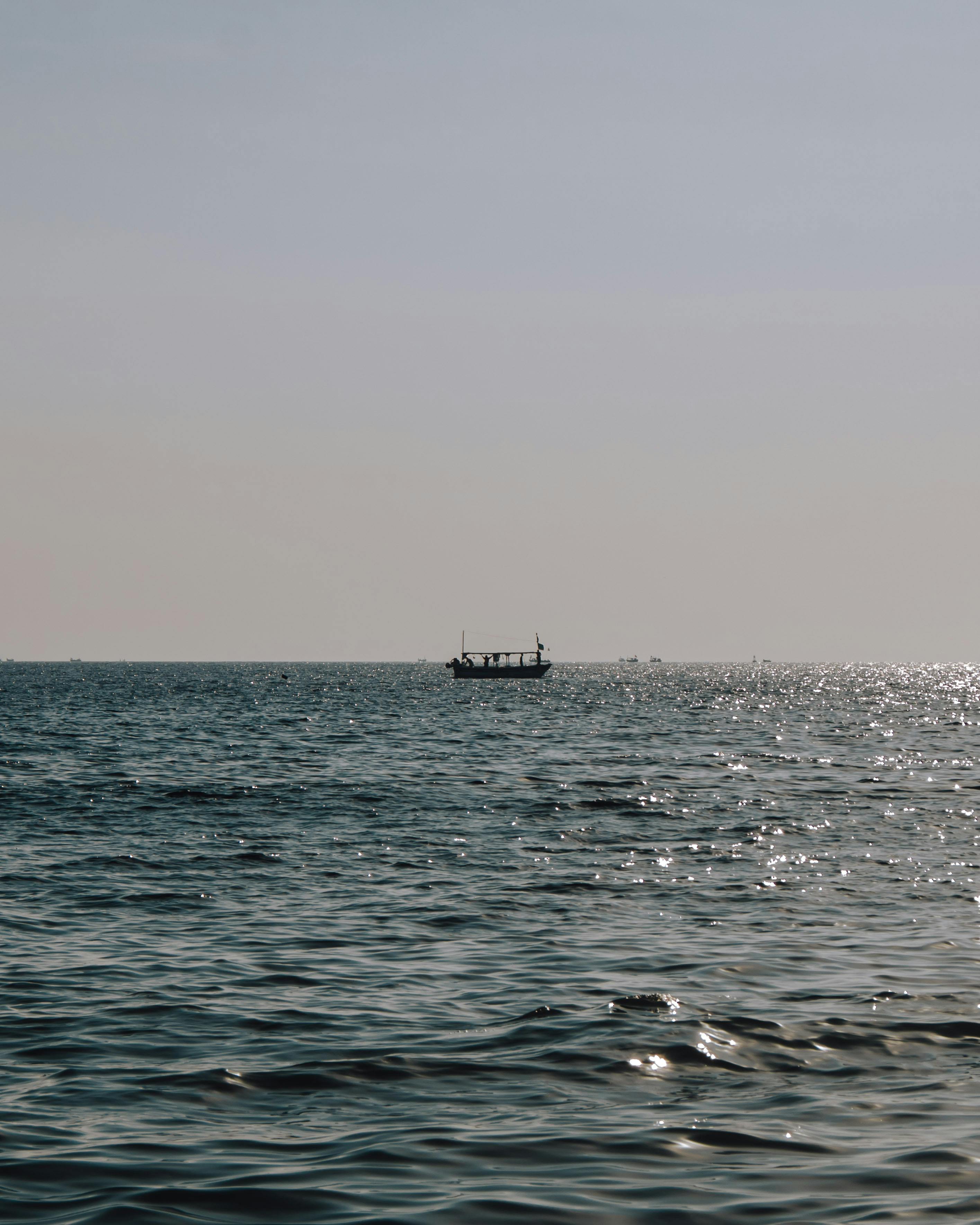 Boat on Calm Sea · Free Stock Photo