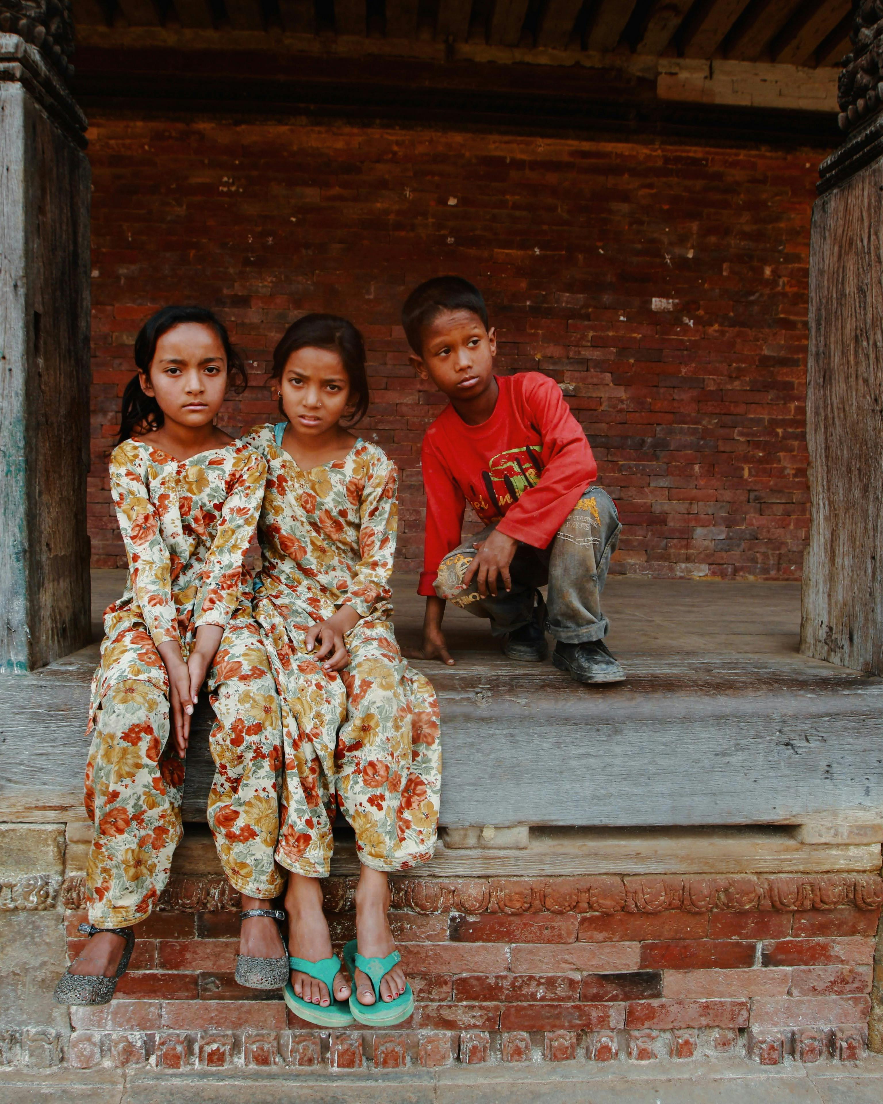 Children Sitting on Step · Free Stock Photo