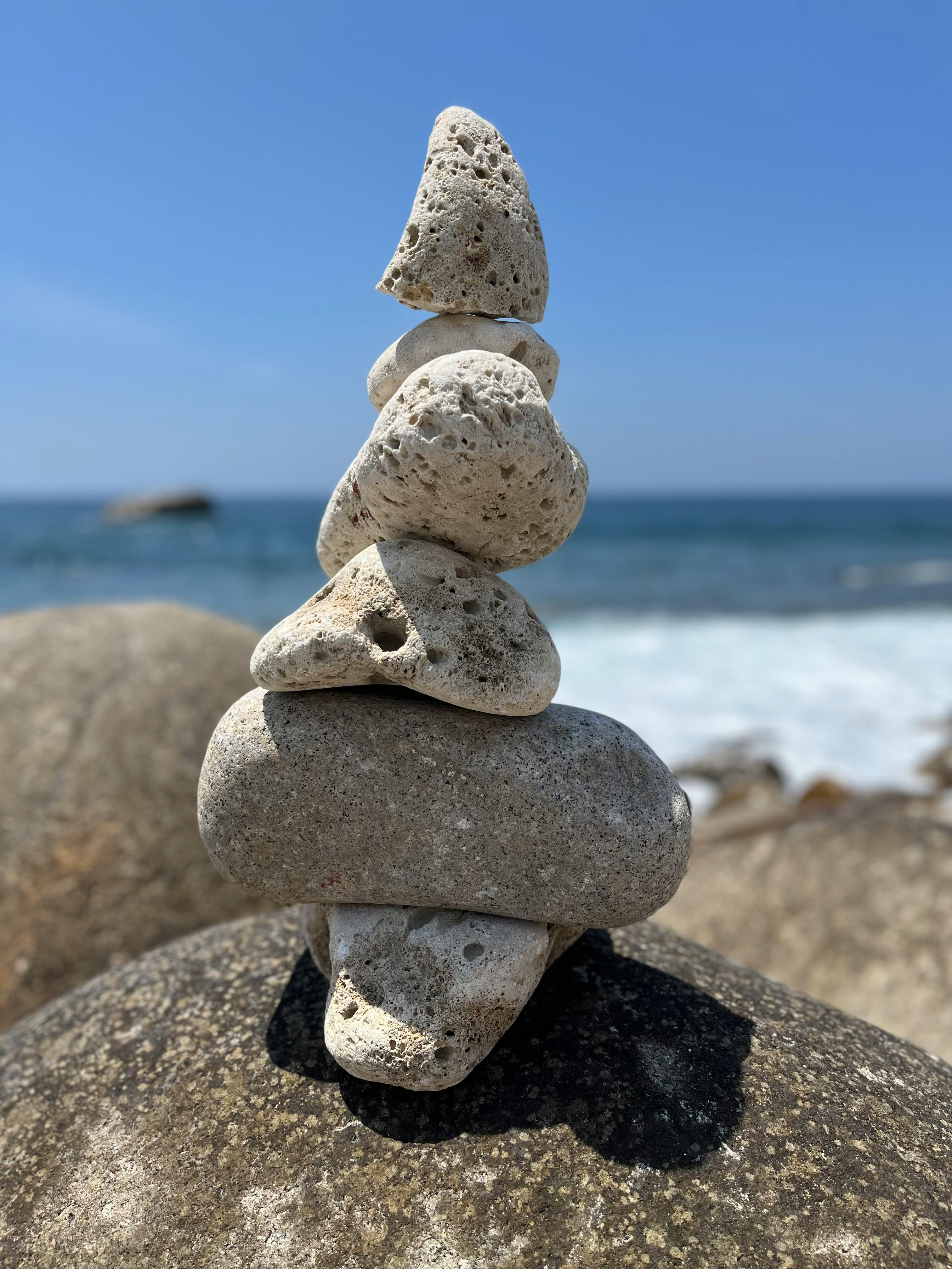 Heap of Stones on Sea Shore · Free Stock Photo