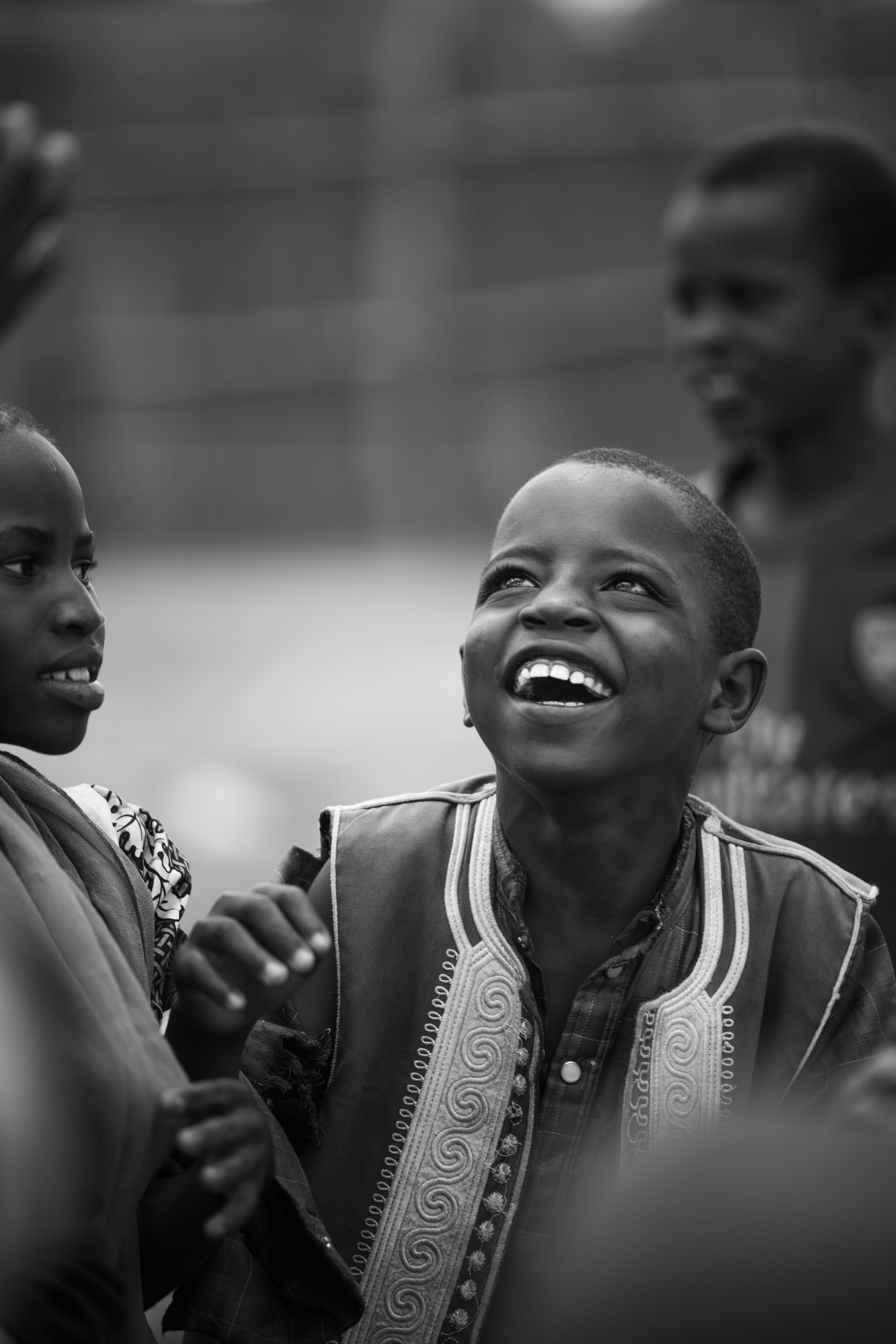 Smiling Boy Looking Up · Free Stock Photo