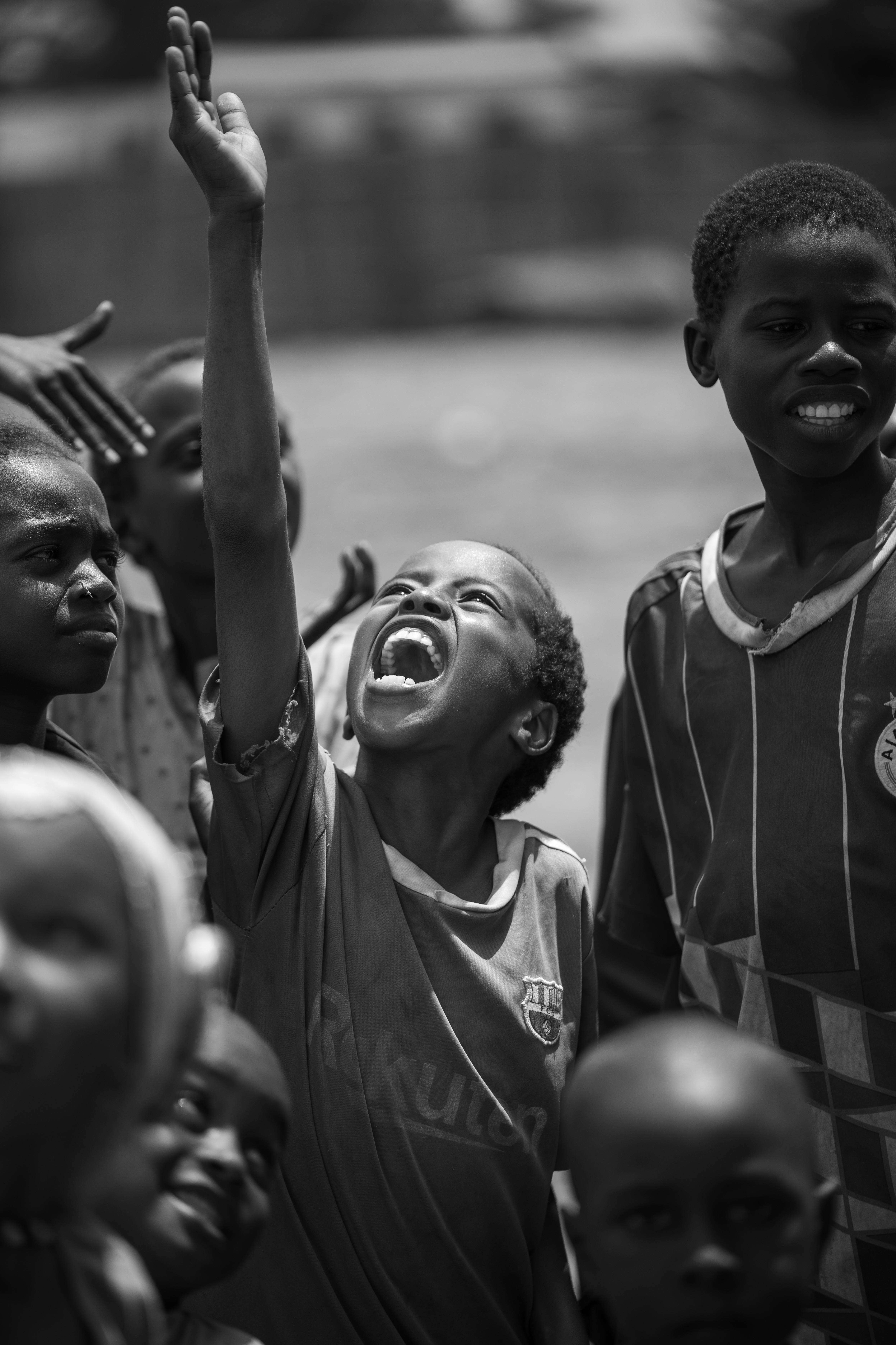 Boy Rising Hand in to Sky · Free Stock Photo