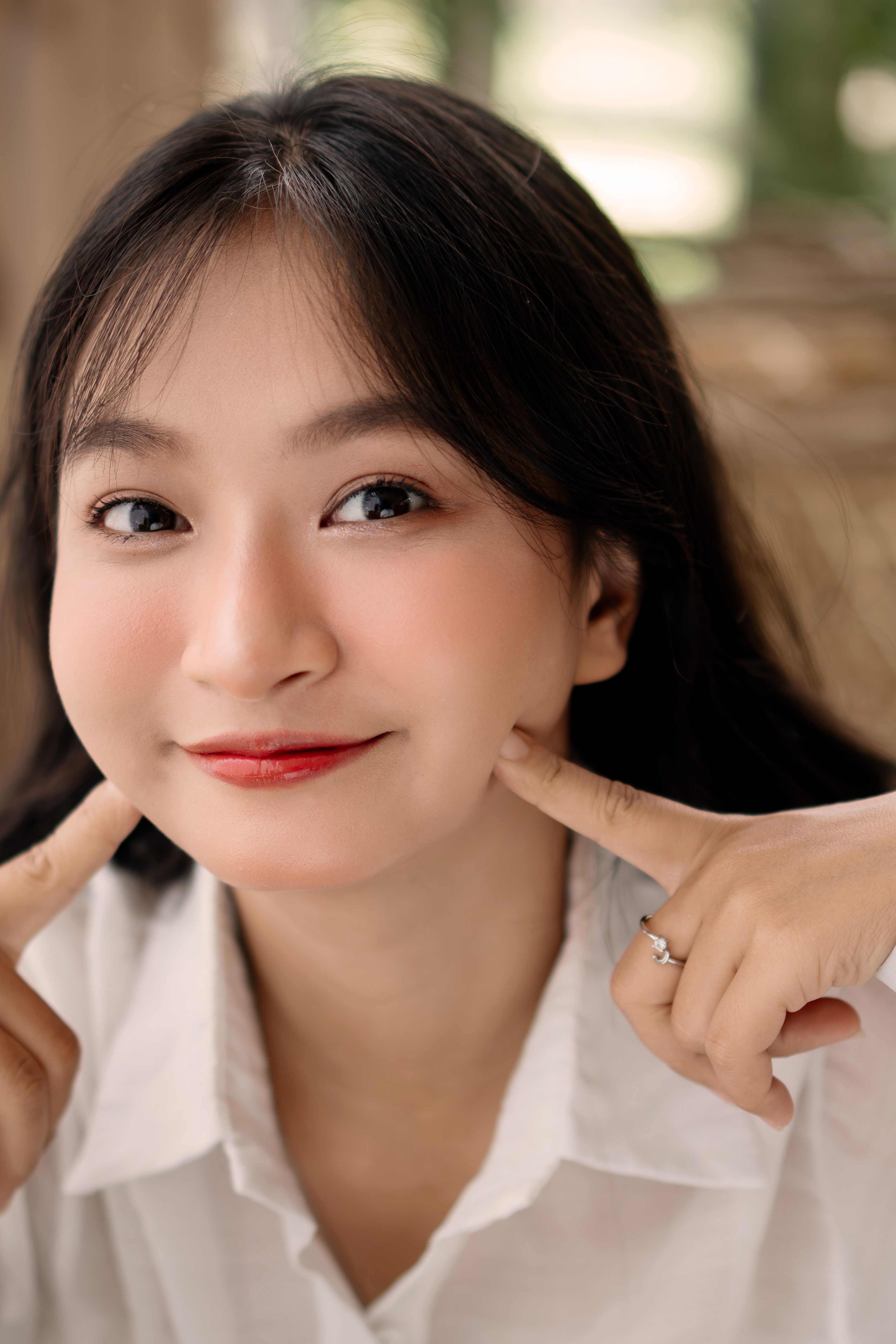 Portrait of a Young Woman Smiling · Free Stock Photo