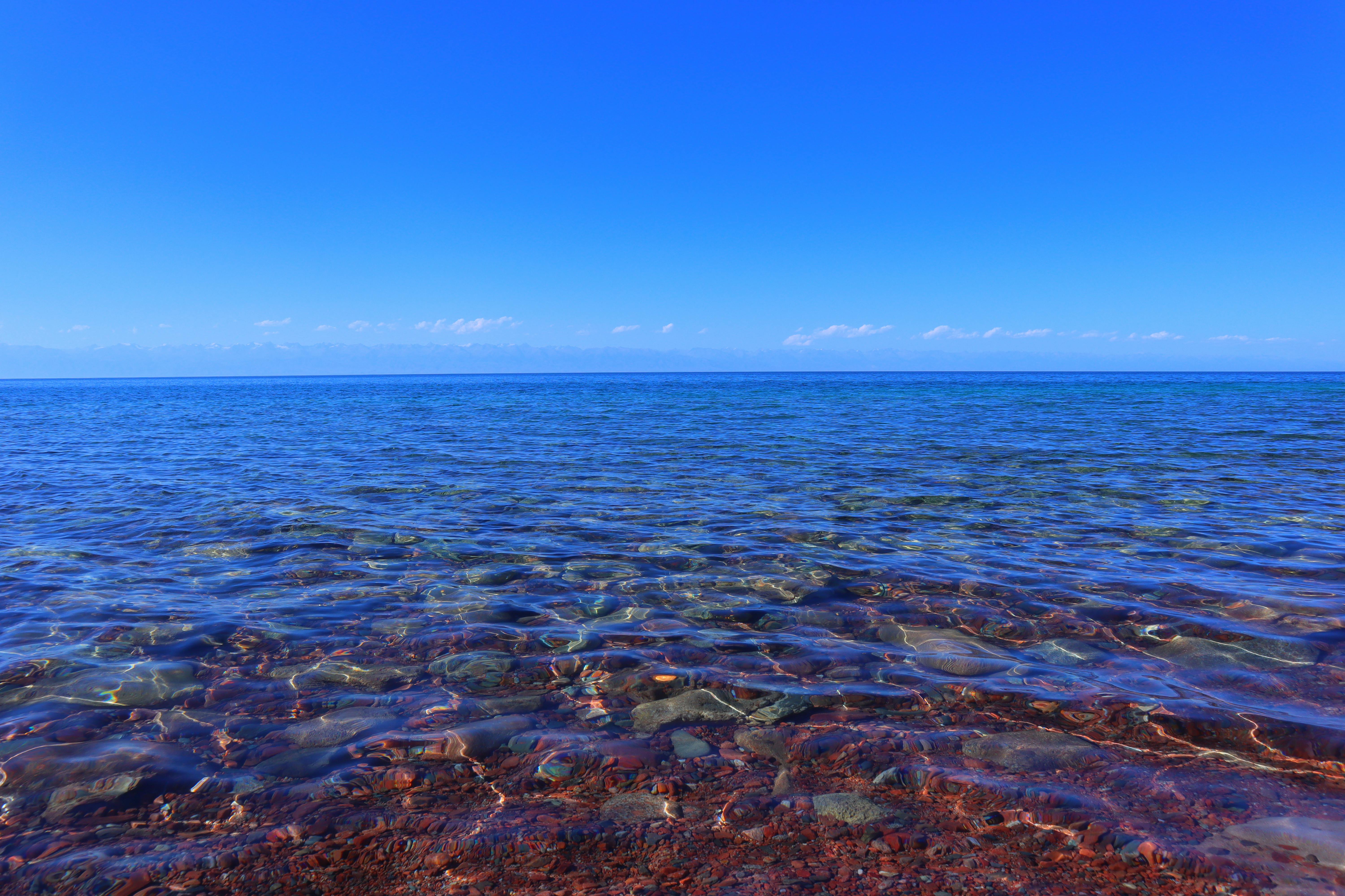 Shallow, Transparent Water on Shore · Free Stock Photo