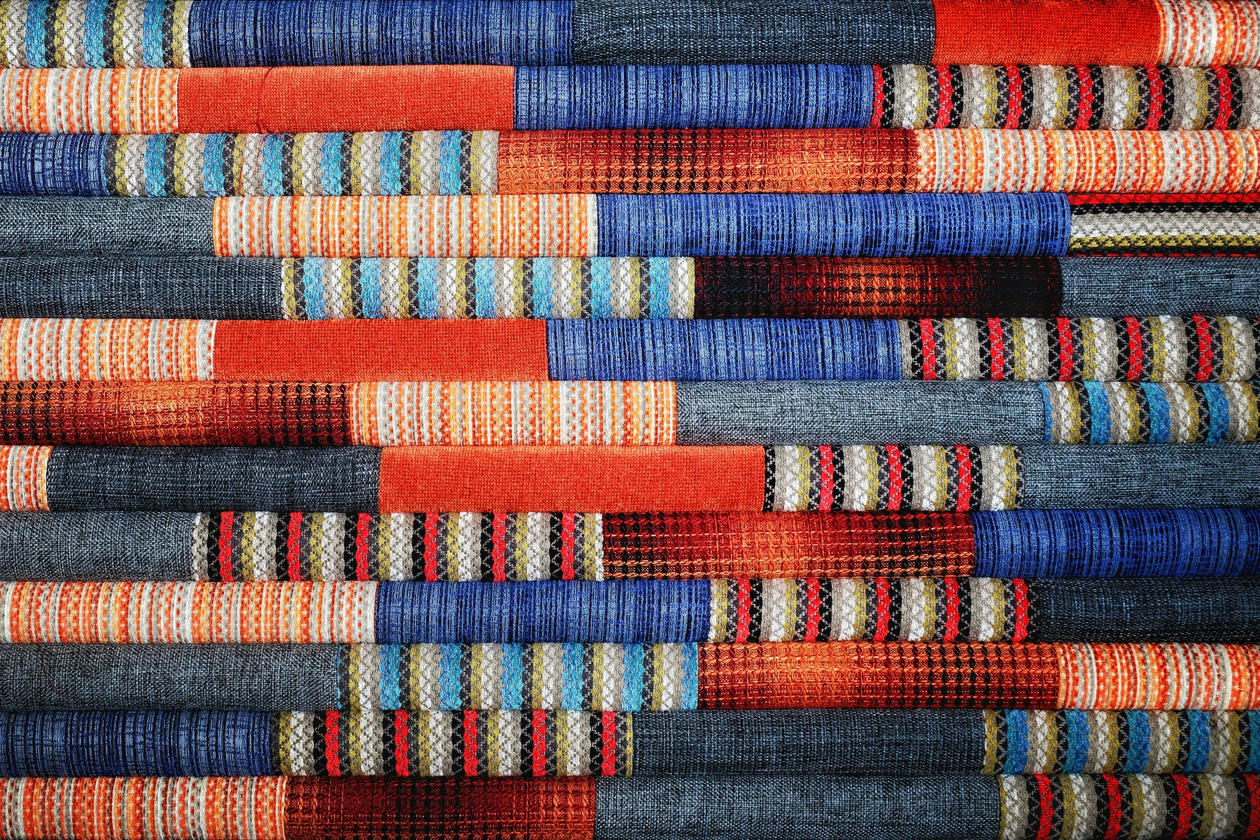 Close-up of a Stack of Fabric with Different Patterns · Free Stock Photo