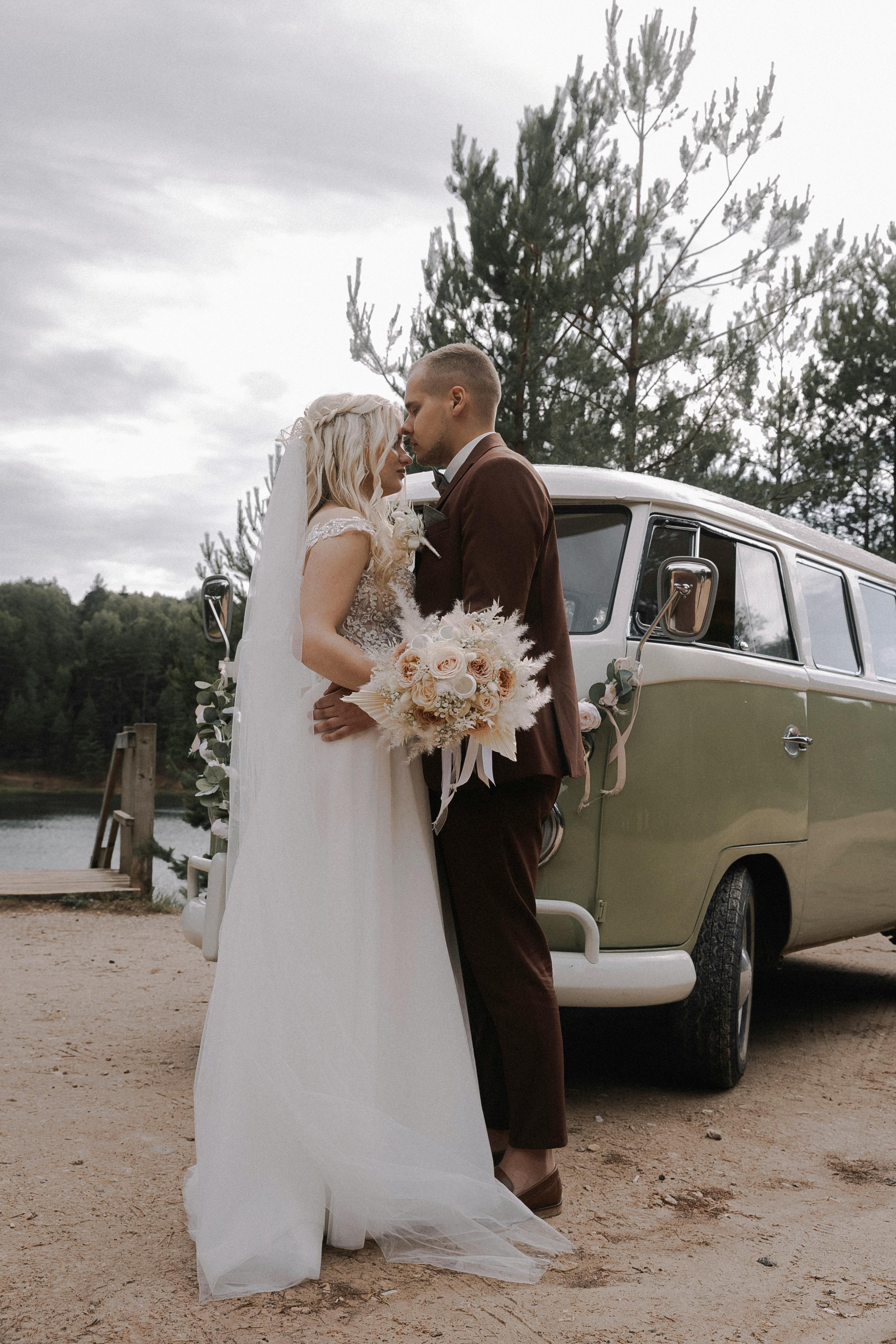 Newlywed Couple Showing Wedding Rings · Free Stock Photo