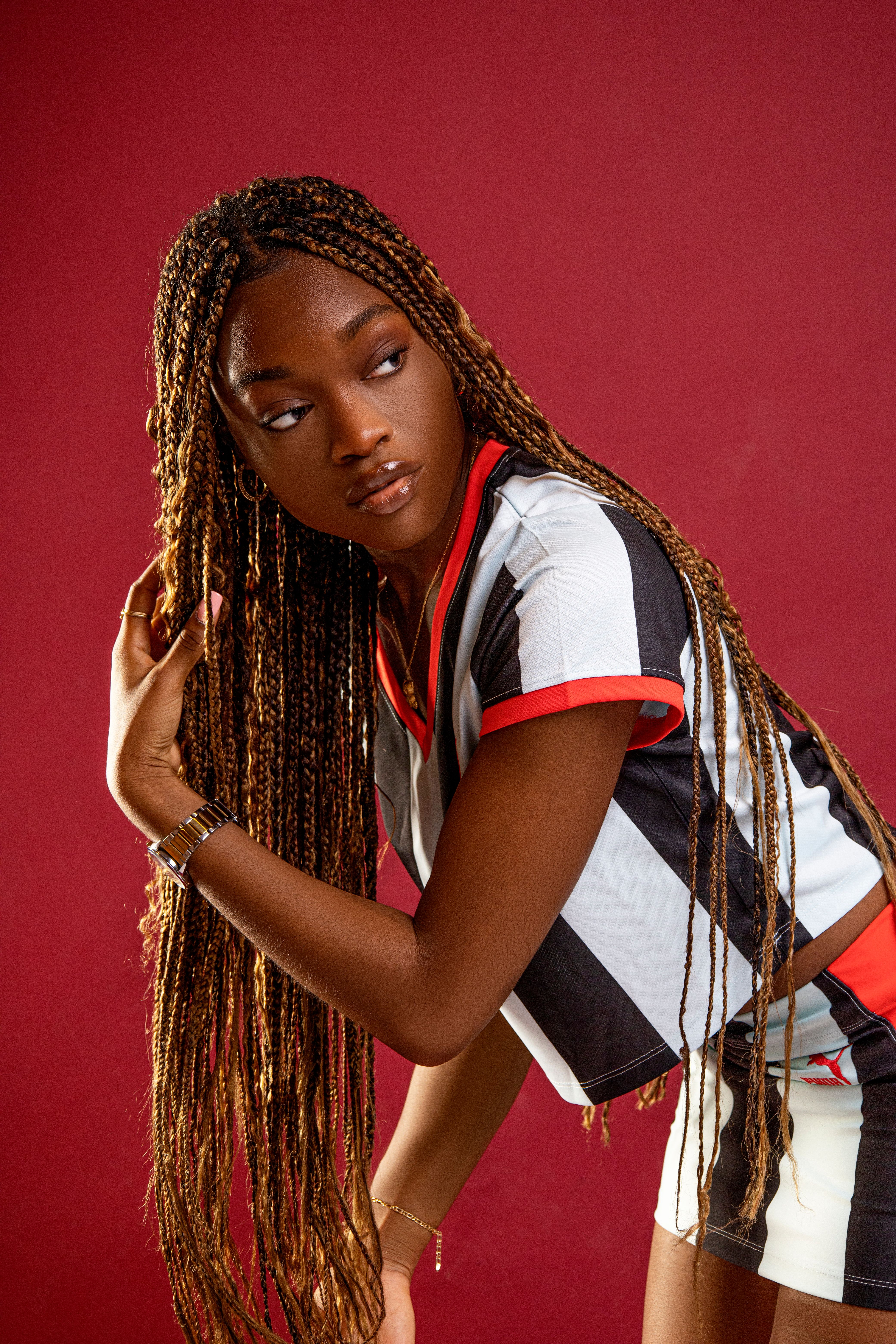 Beautiful Woman with Dreadlocks Posing in Studio · Free Stock Photo