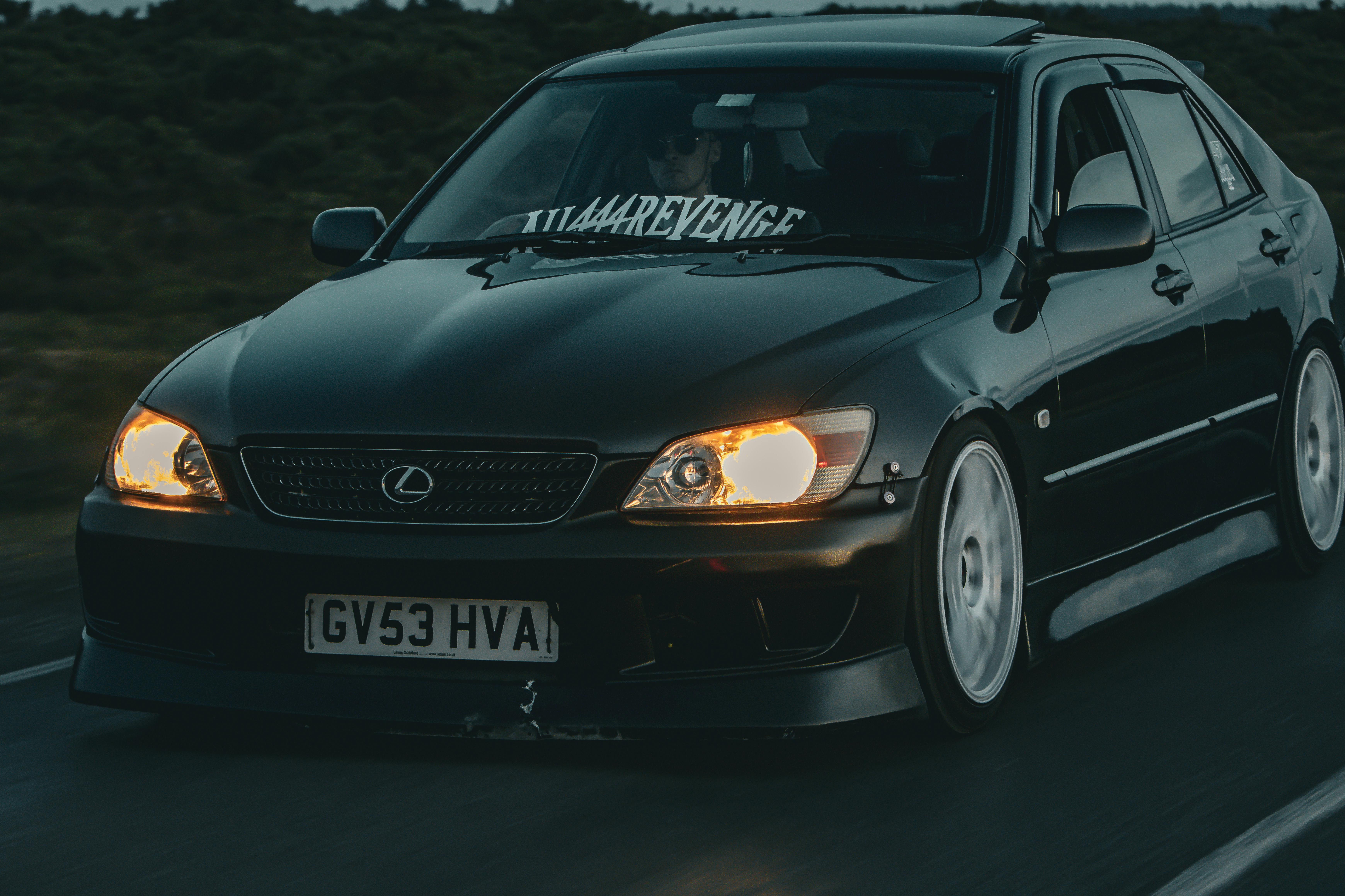 A Modified Black Lexus IS200 on the Street · Free Stock Photo