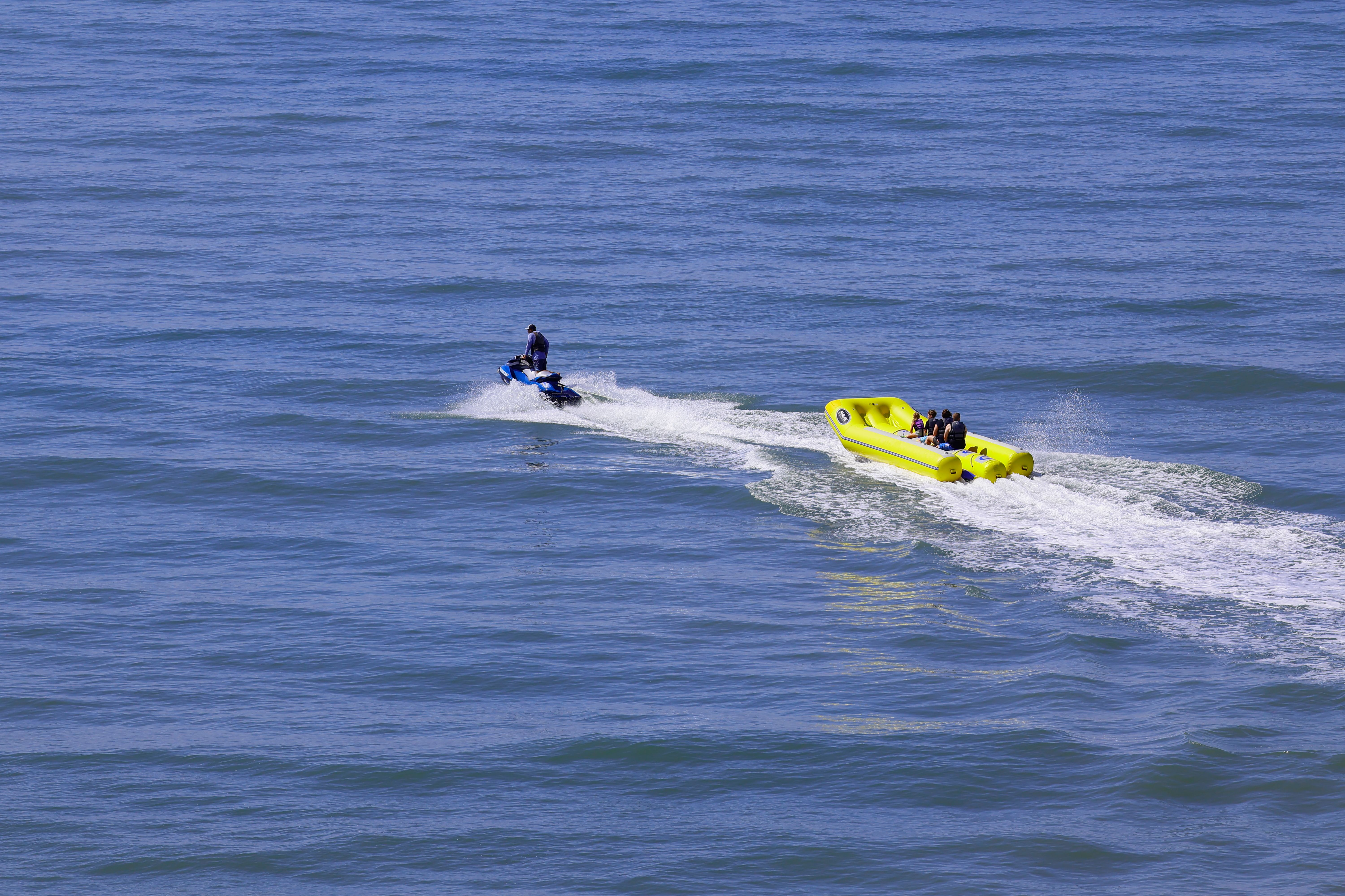Sexy Woman in Bikini Riding Jet Ski · Free Stock Photo