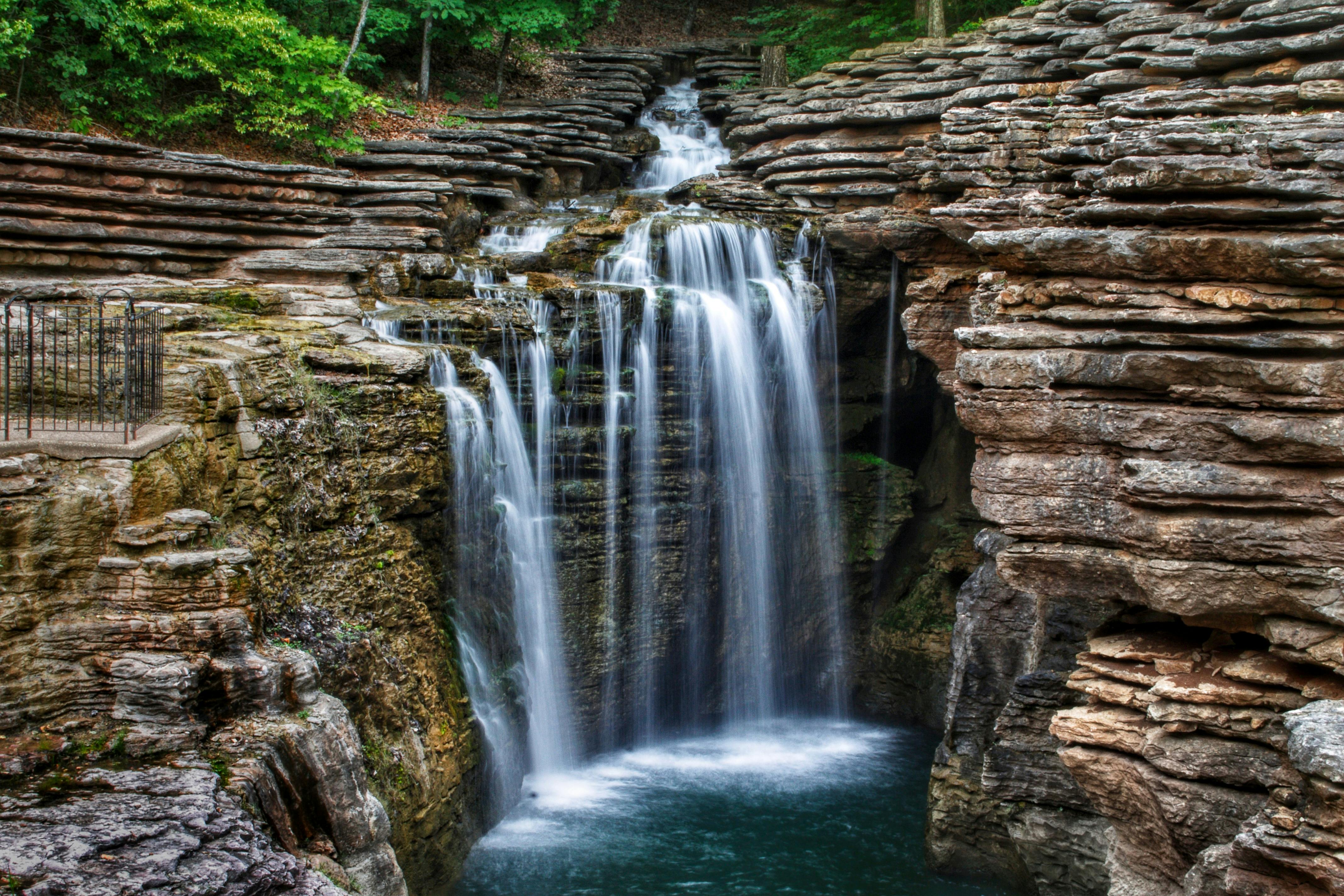 Rock Formation with a Waterfall · Free Stock Photo