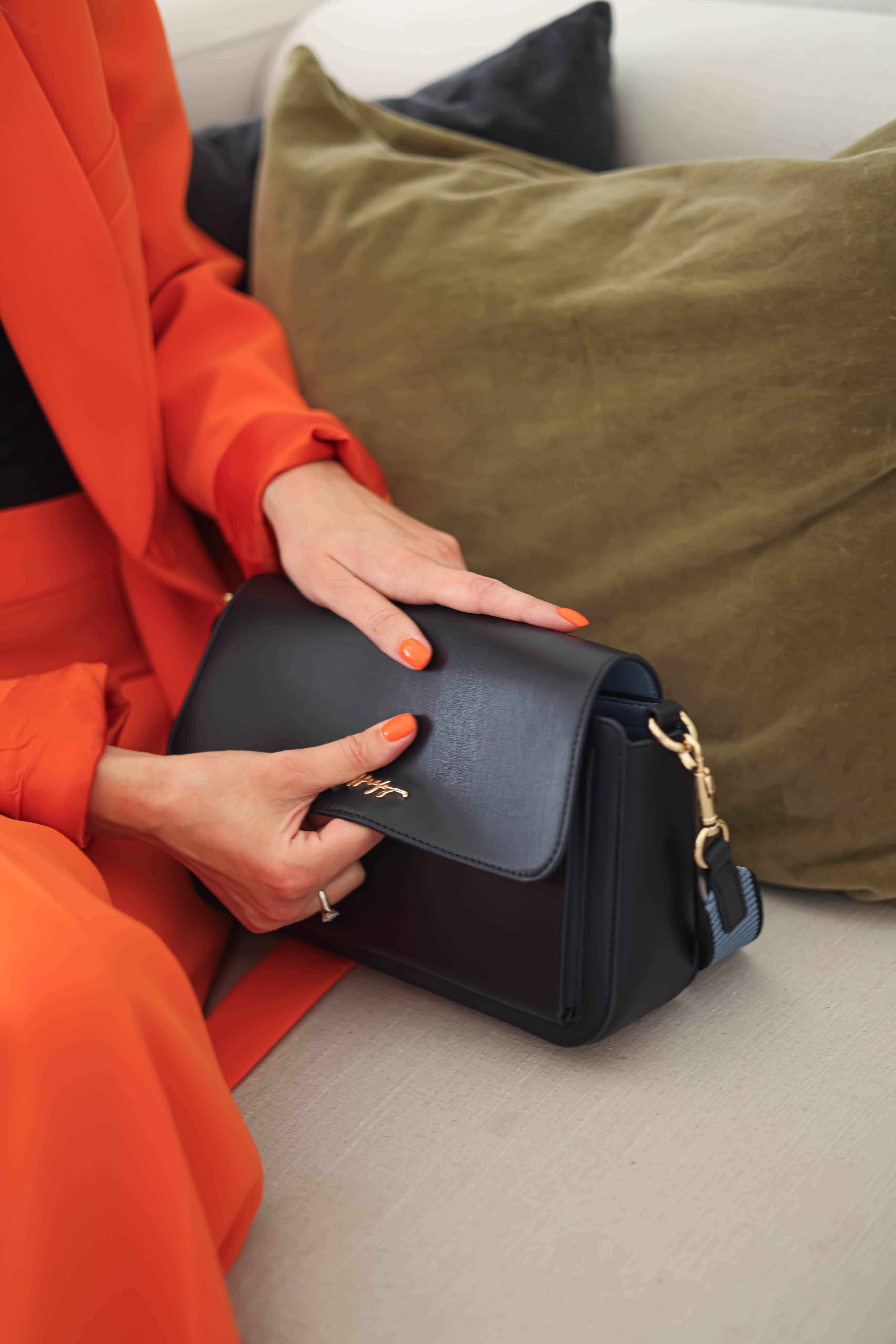 A Person Holding a Leather Bag · Free Stock Photo