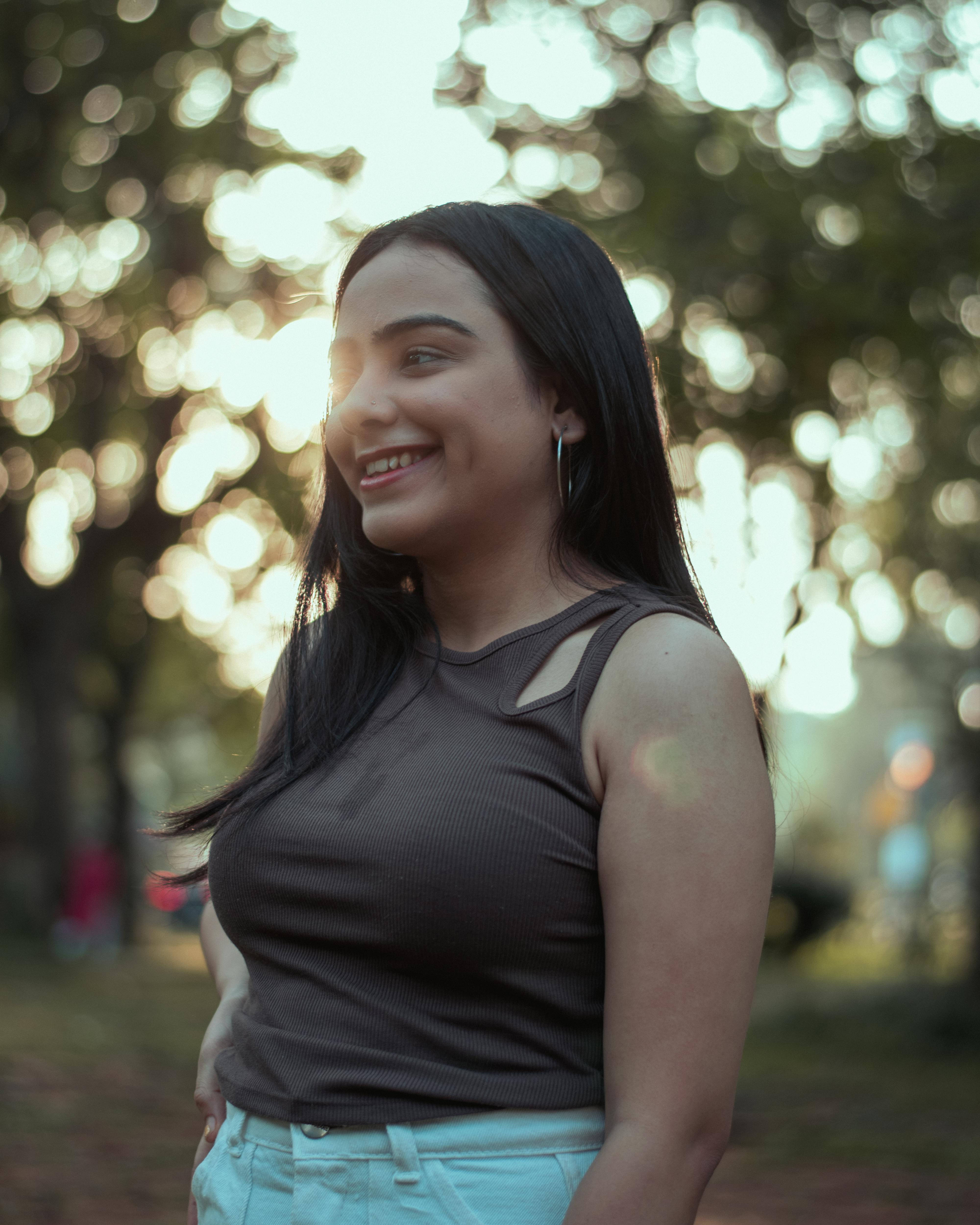 Woman in Sunlight Smiling · Free Stock Photo