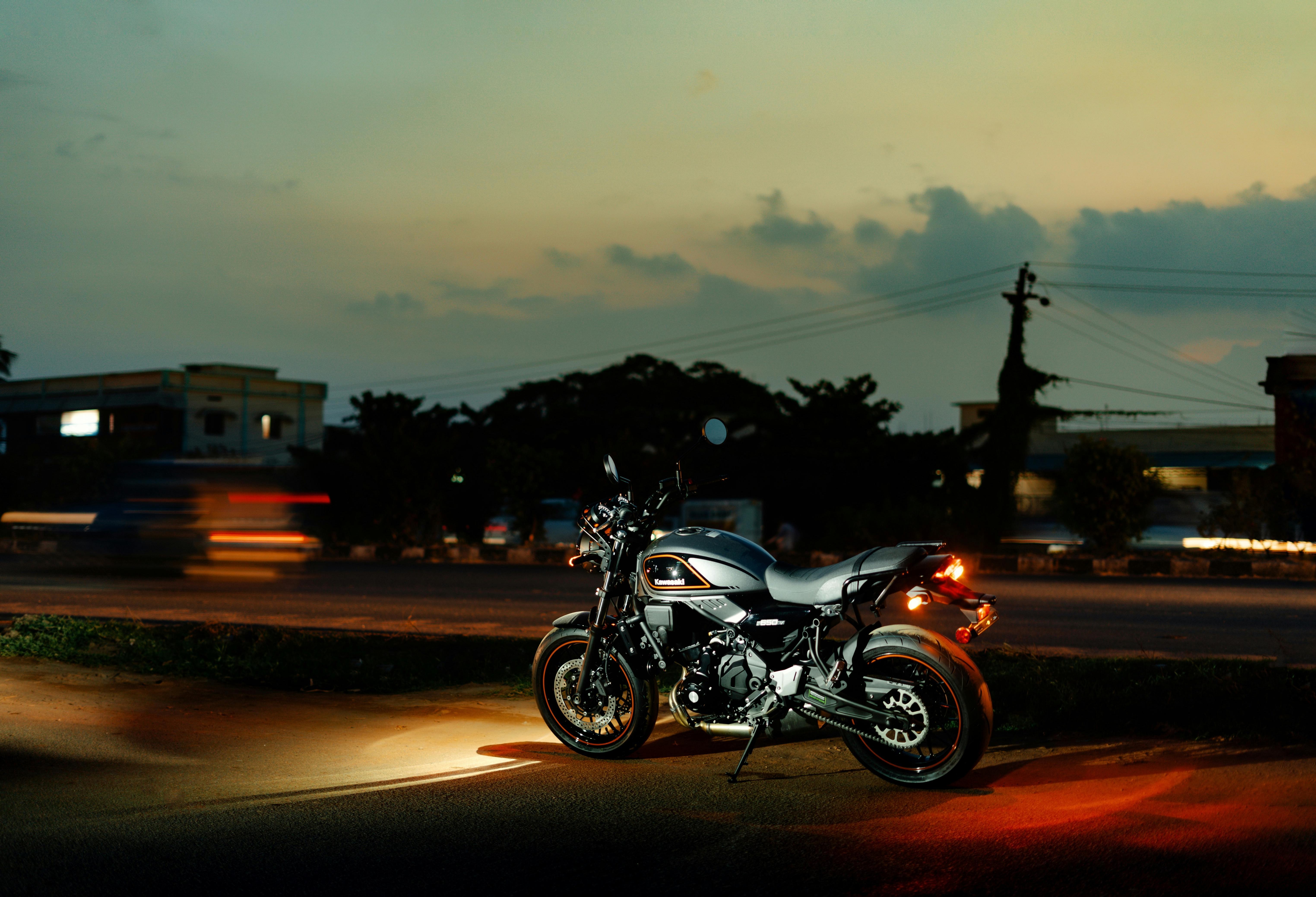 Illuminated Motorcycle at Dusk · Free Stock Photo