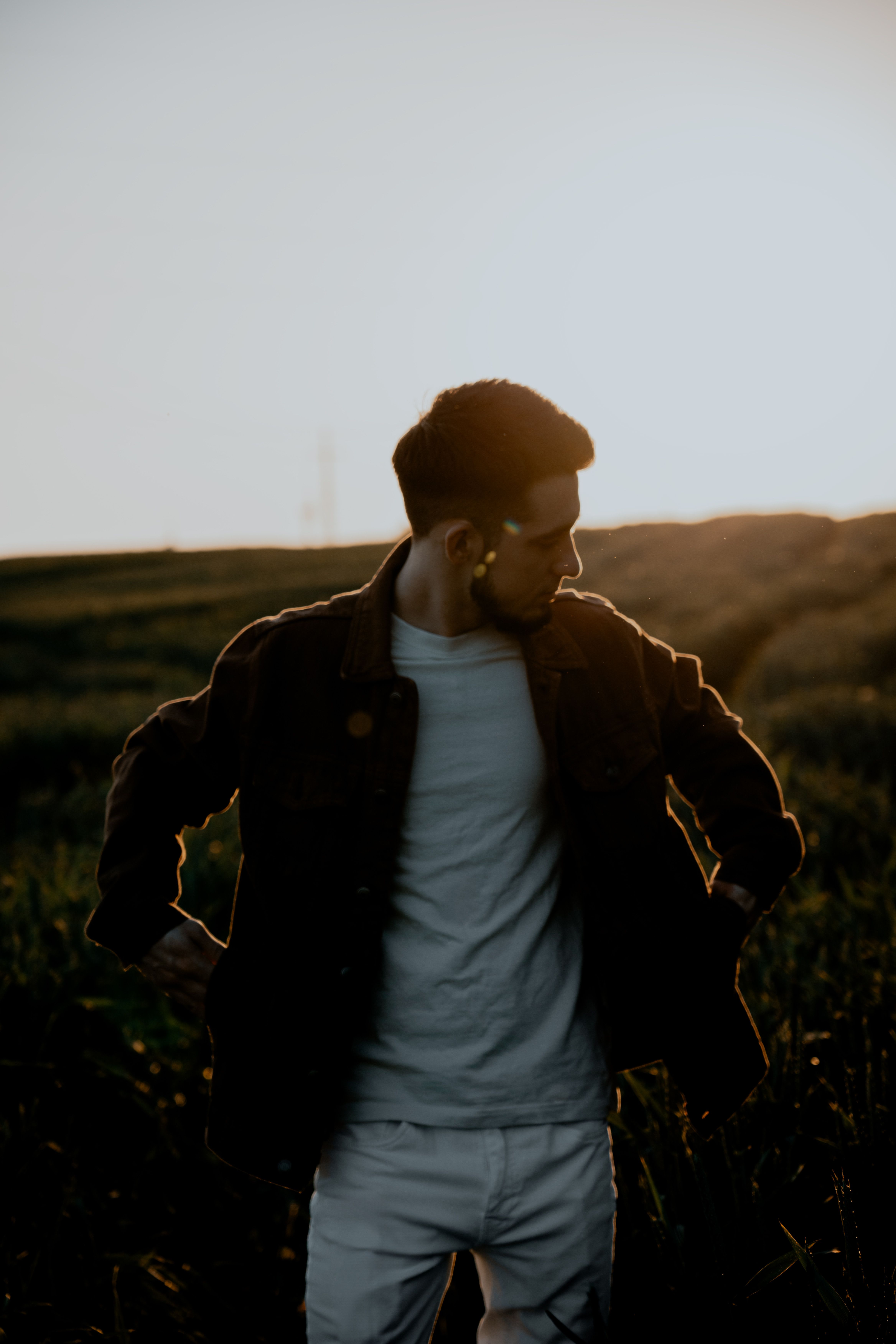 Male Model Posing Outdoors at Sunset · Free Stock Photo