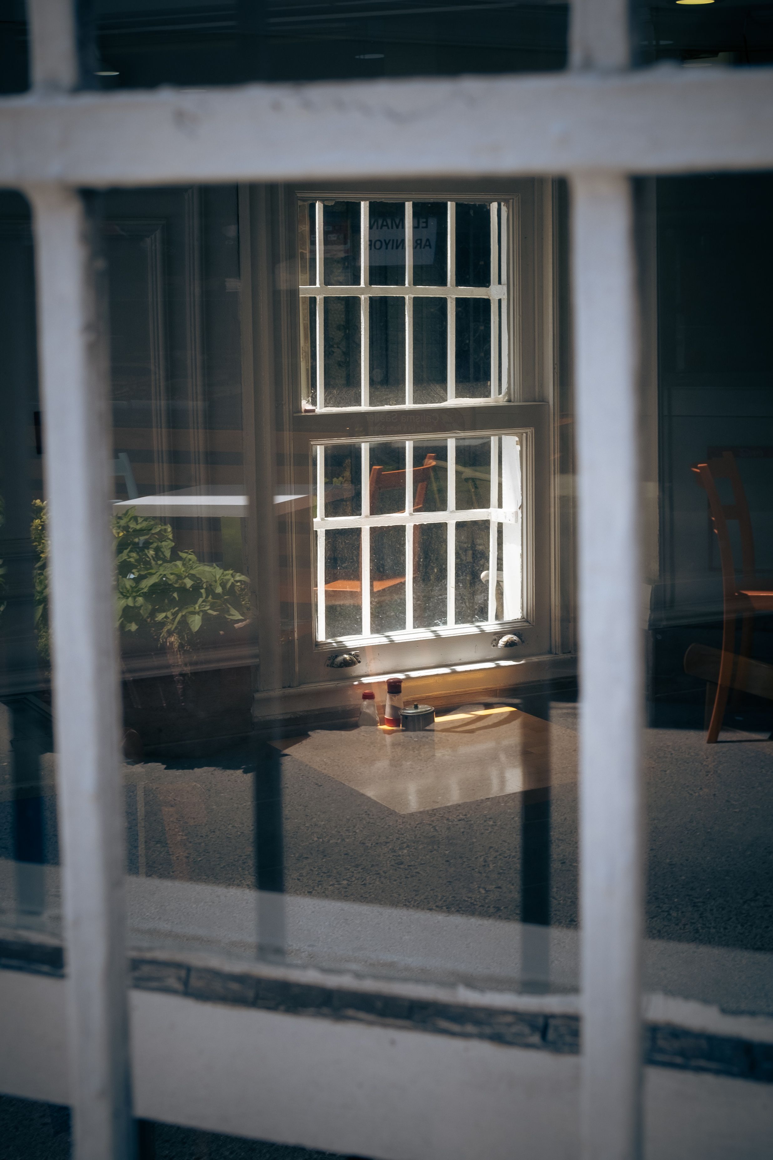 House Interior seen through a Secured Window · Free Stock Photo