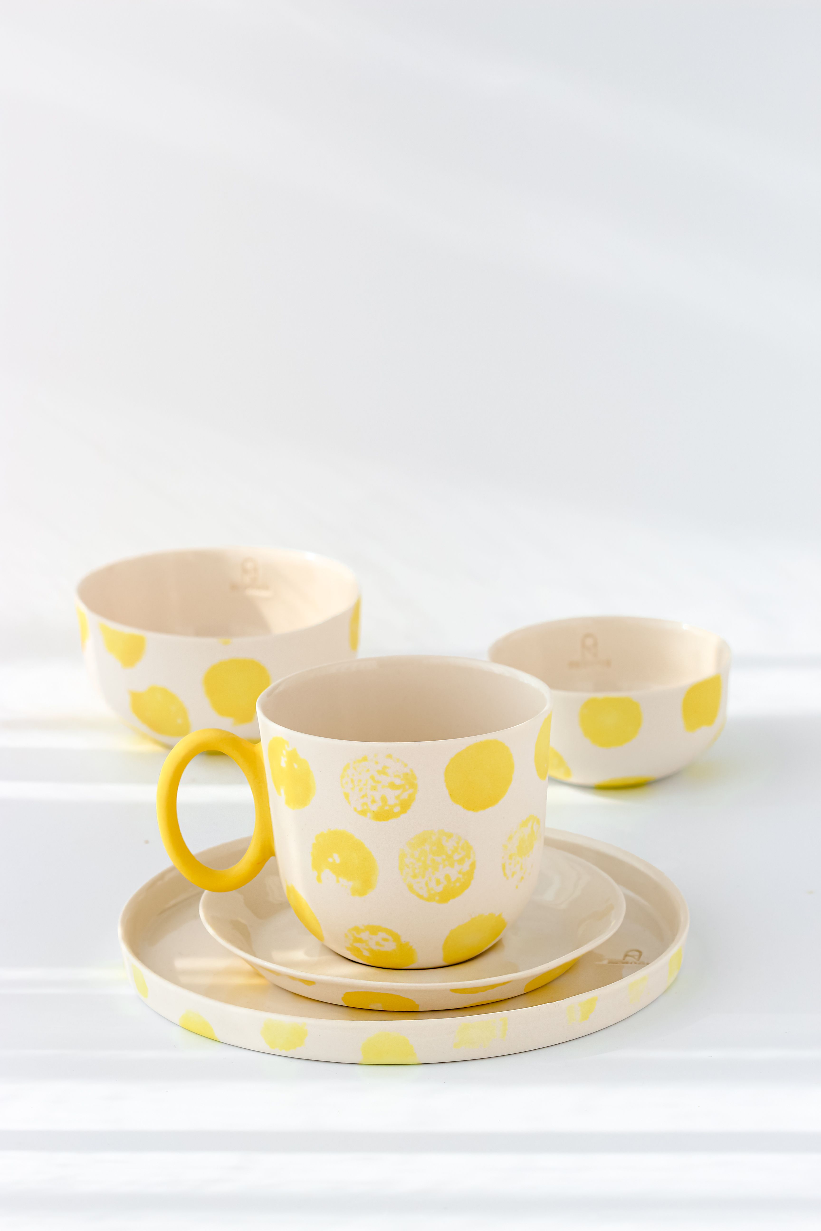 Plate and Cups on White Background · Free Stock Photo