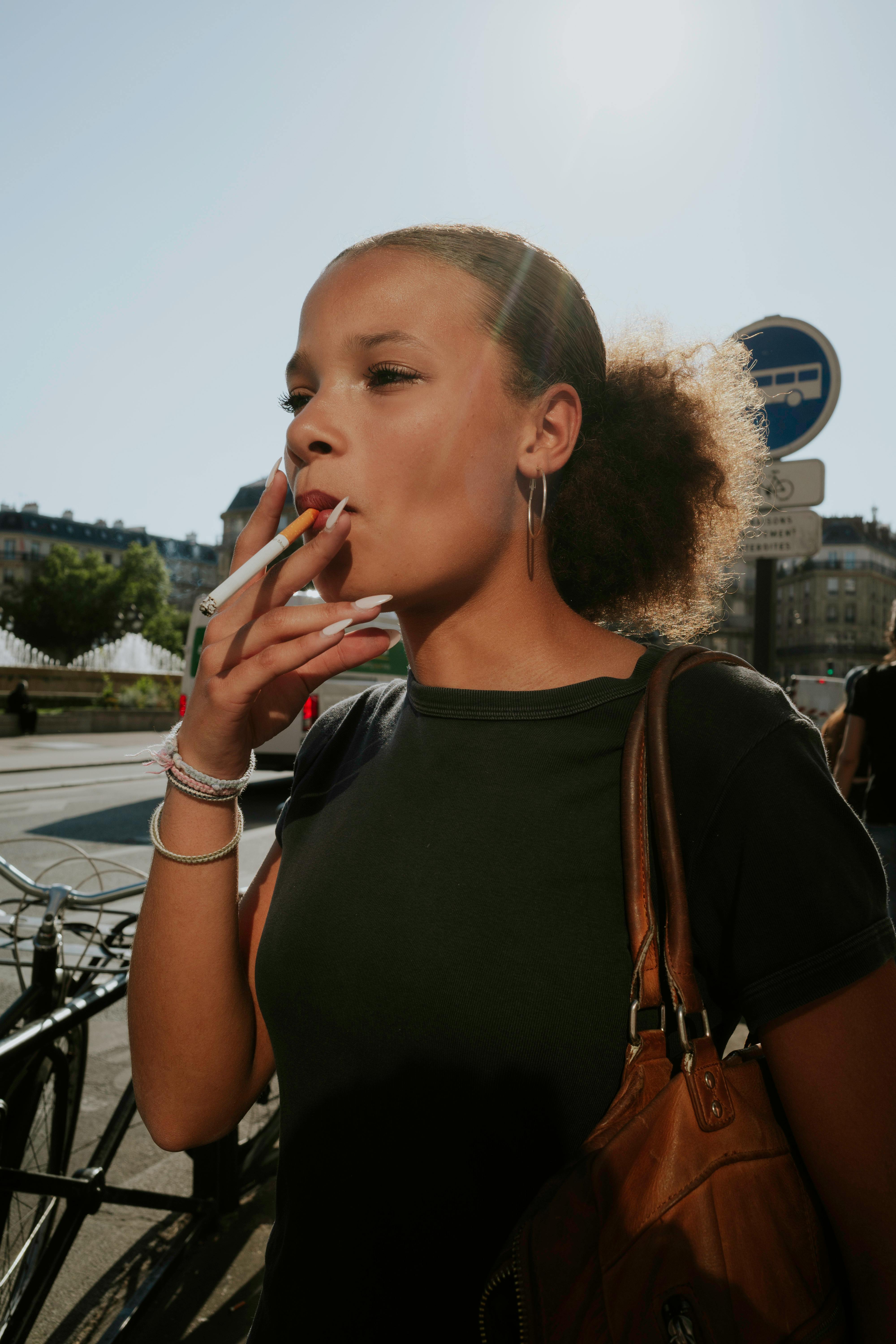 Woman Smoking Cigarette · Free Stock Photo