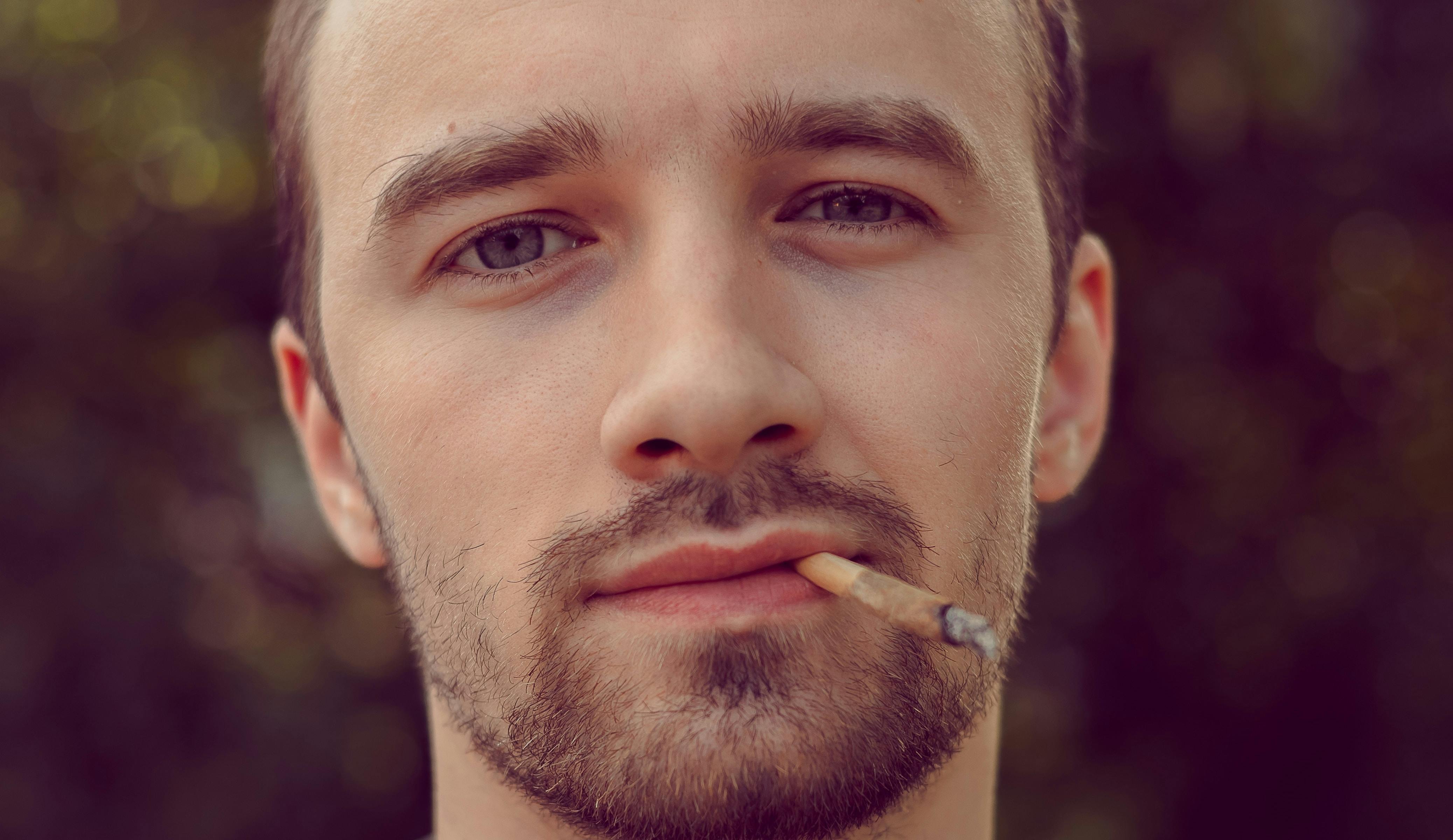 Face of Smoking Man · Free Stock Photo
