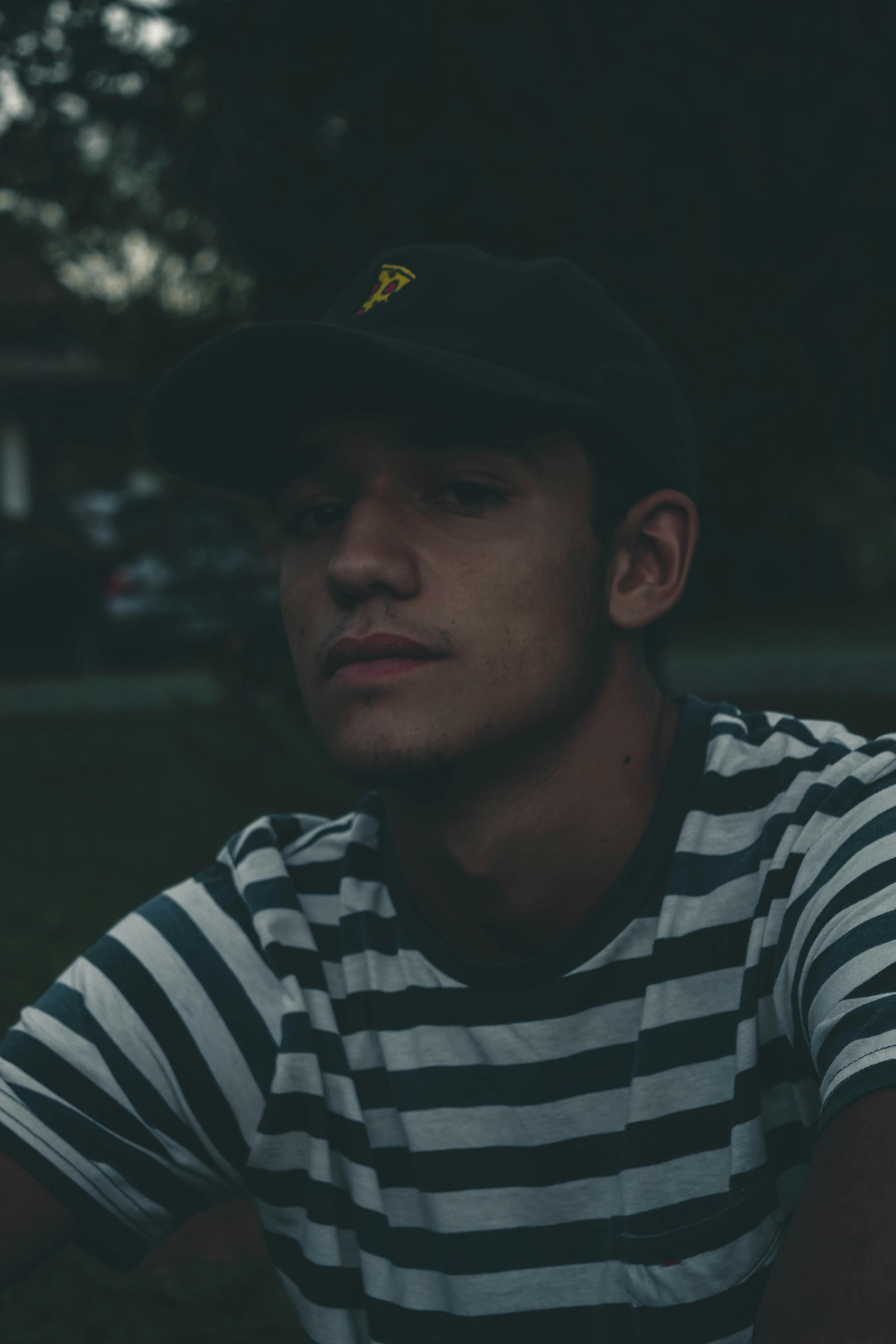 Photo of Man Wearing Striped Shirt · Free Stock Photo
