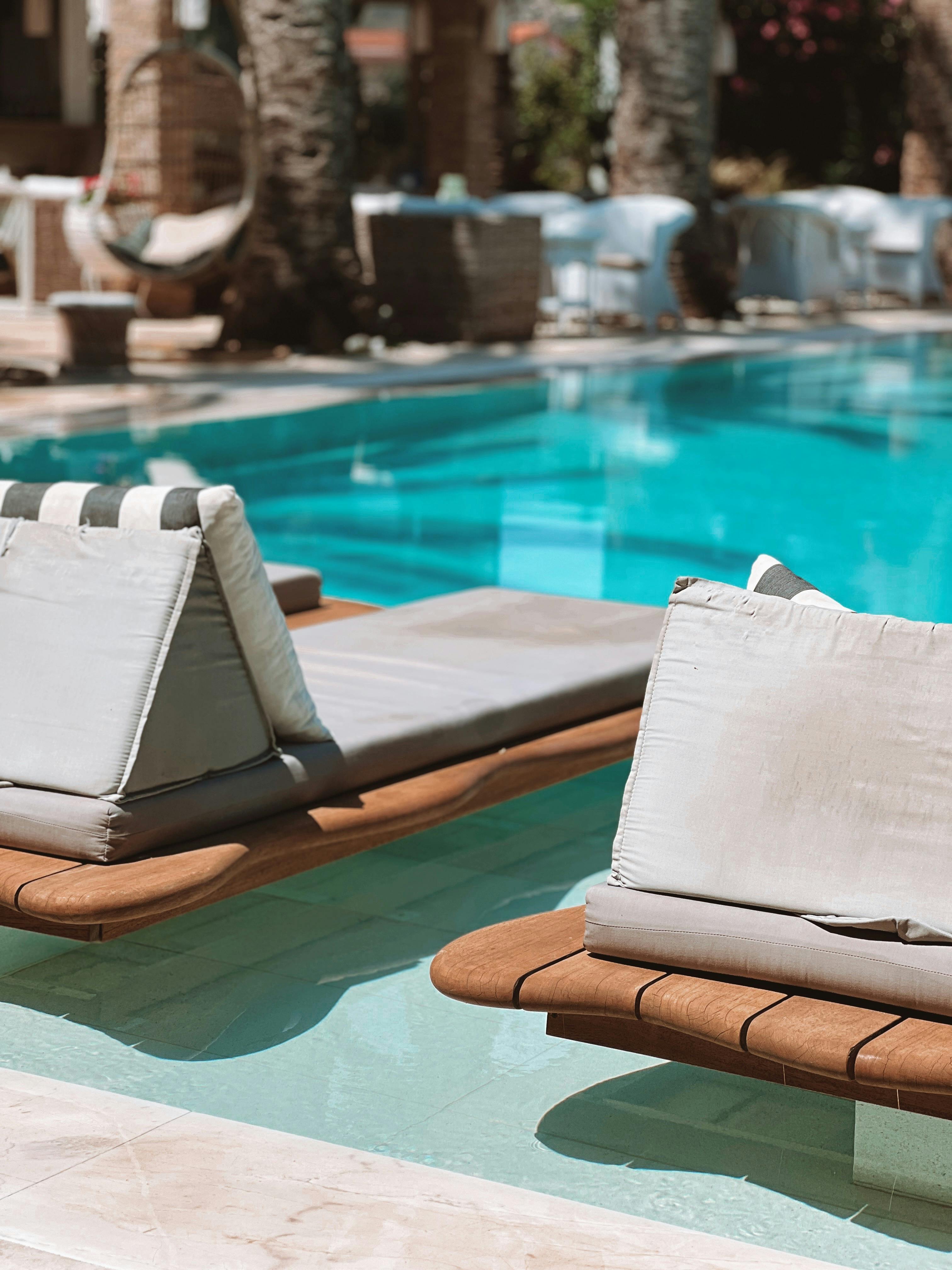 Sunbeds Floating on Water · Free Stock Photo