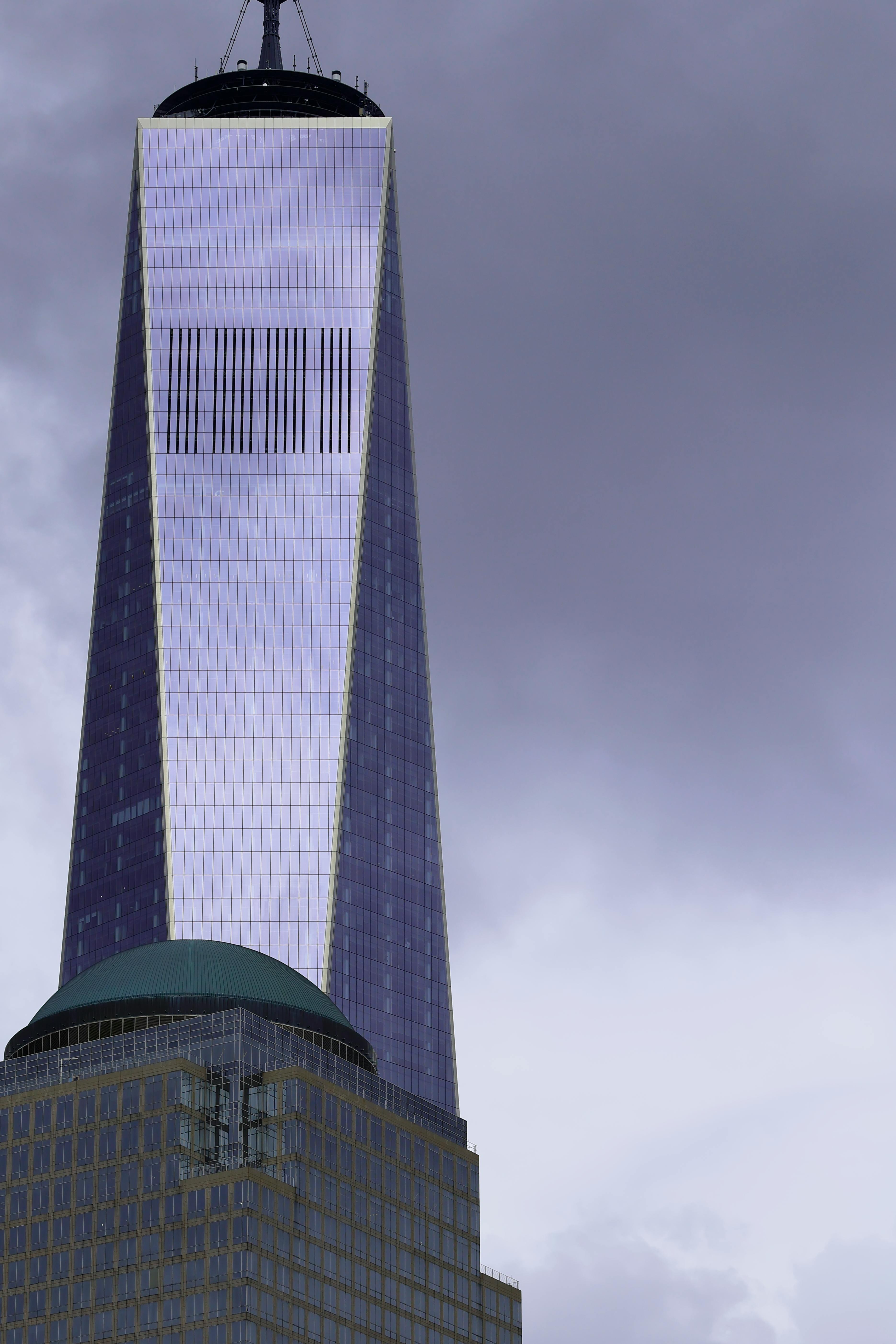 White Concrete Tower Shape Building Near Building during Daytime · Free ...