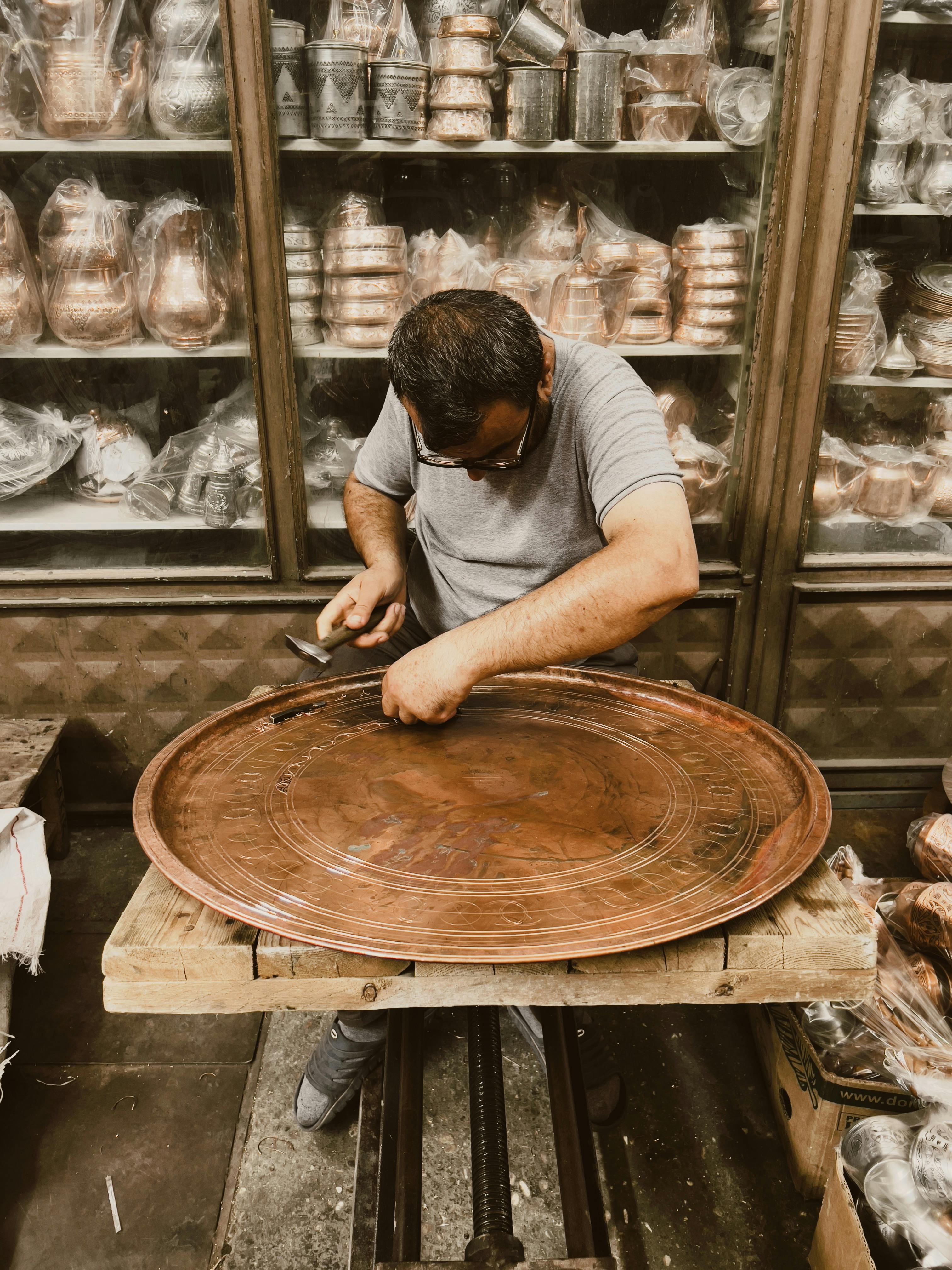 Man Making Decorative Plates · Free Stock Photo