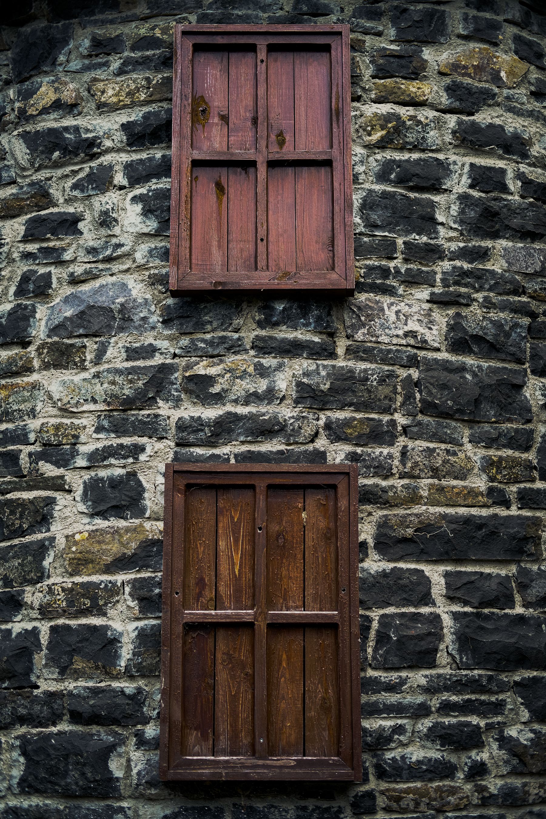Wooden Shutters in Stone Wall · Free Stock Photo