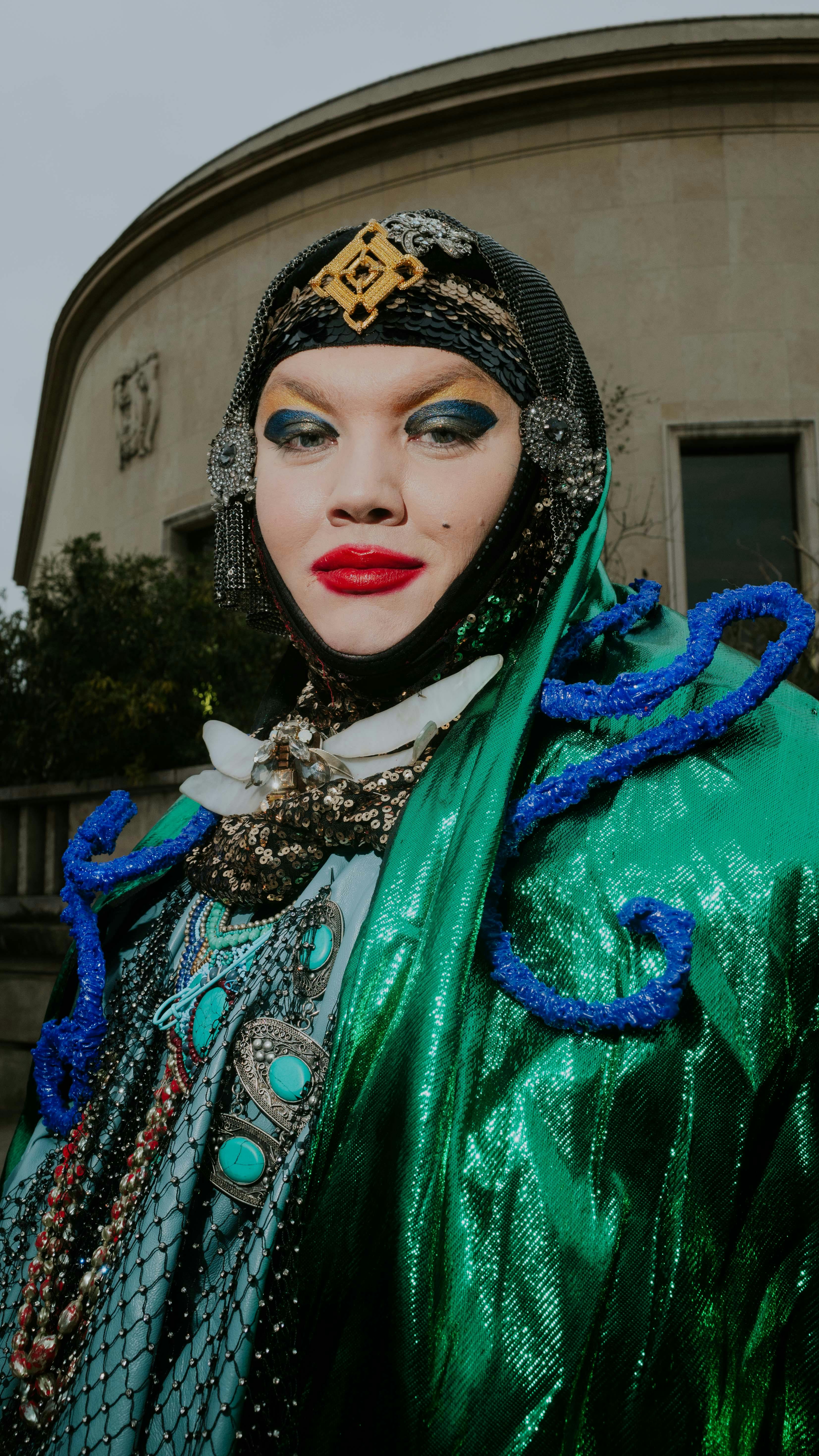 Woman with Bold Makeup in Green Fancy Coat · Free Stock Photo