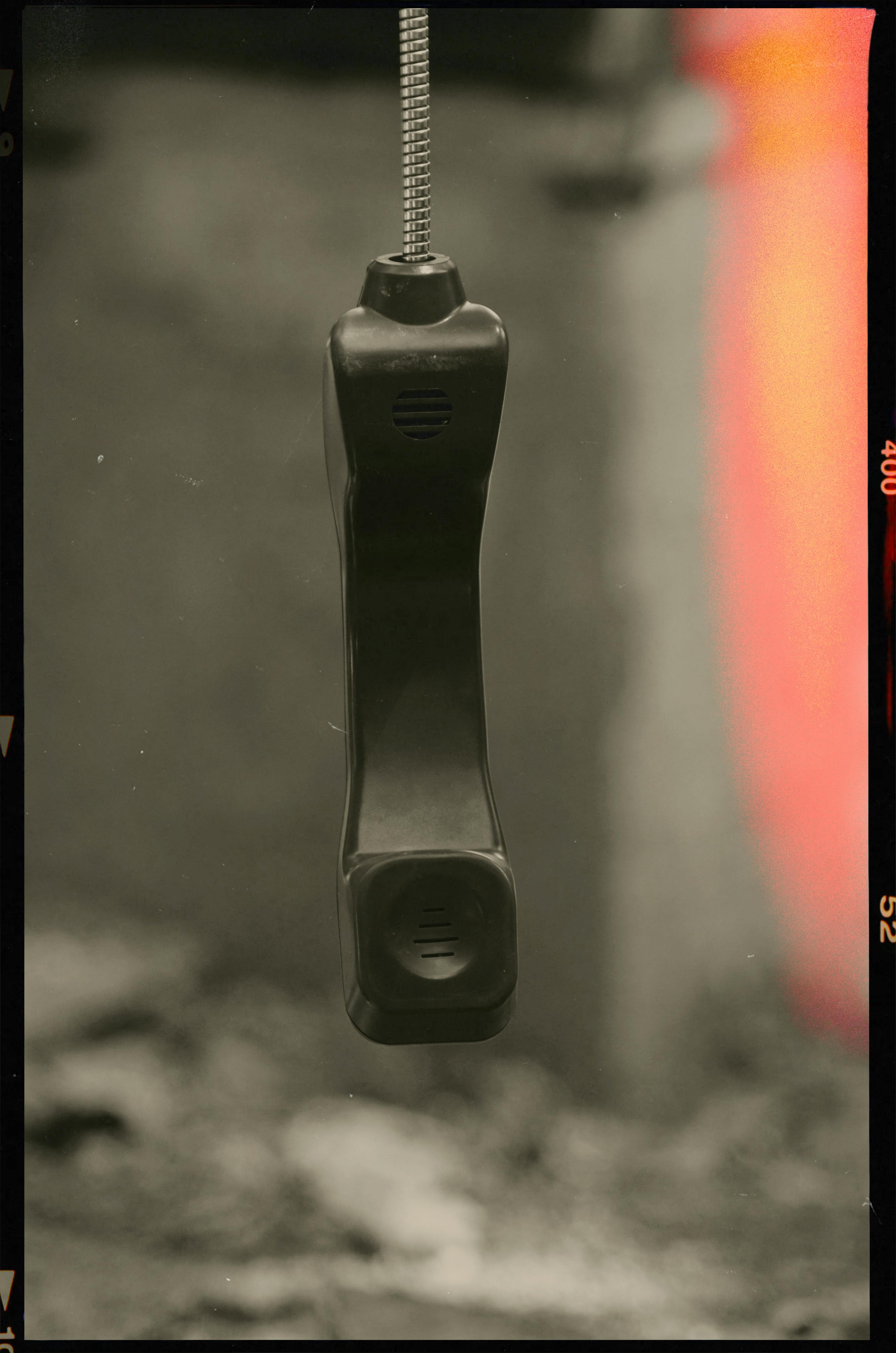 Close-up of a Hanging Receiver of a Vintage Telephone · Free Stock Photo