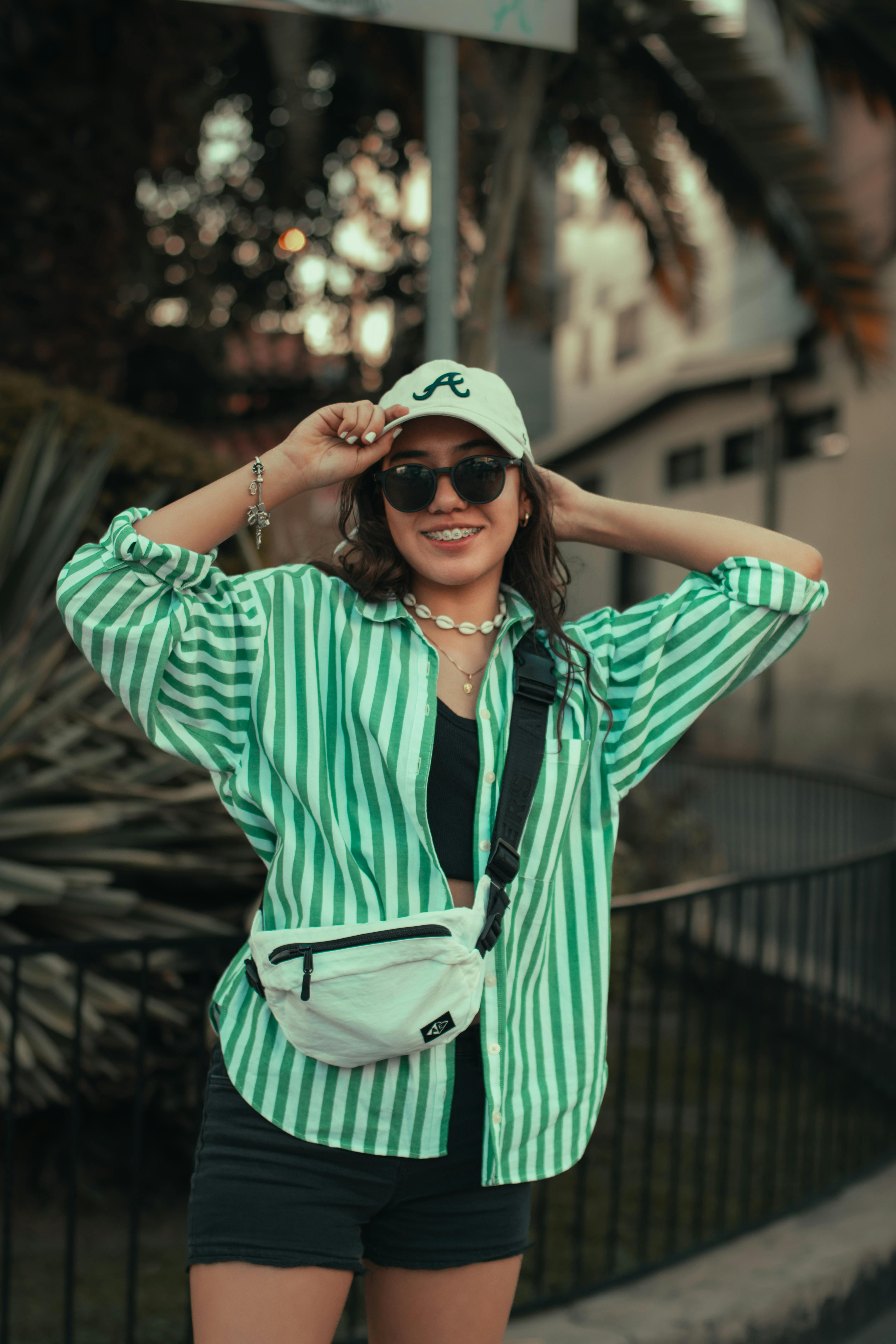 Smiling Girl Wearing a Shirt · Free Stock Photo