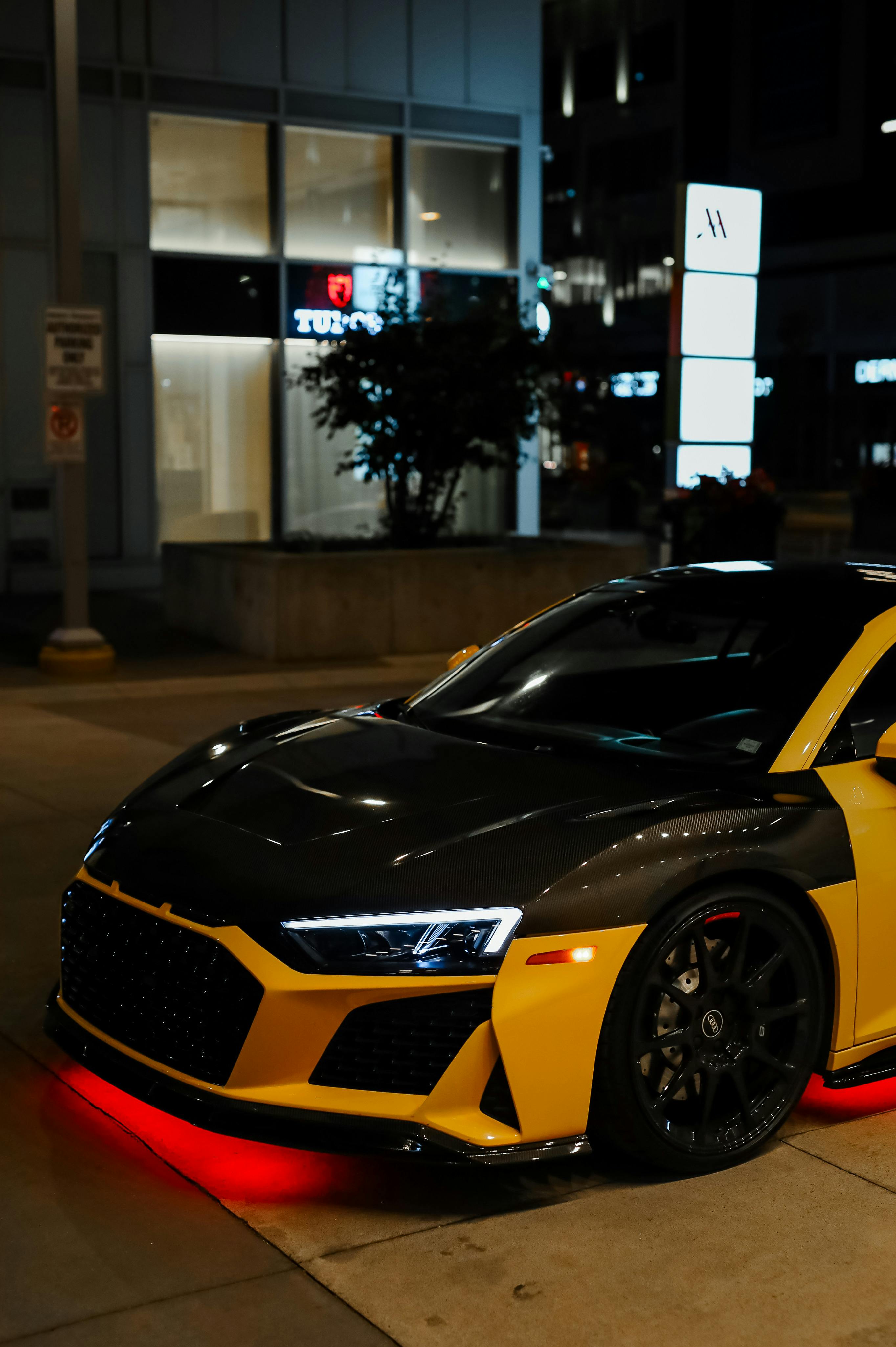 Sports Car Parked in front of a Store · Free Stock Photo