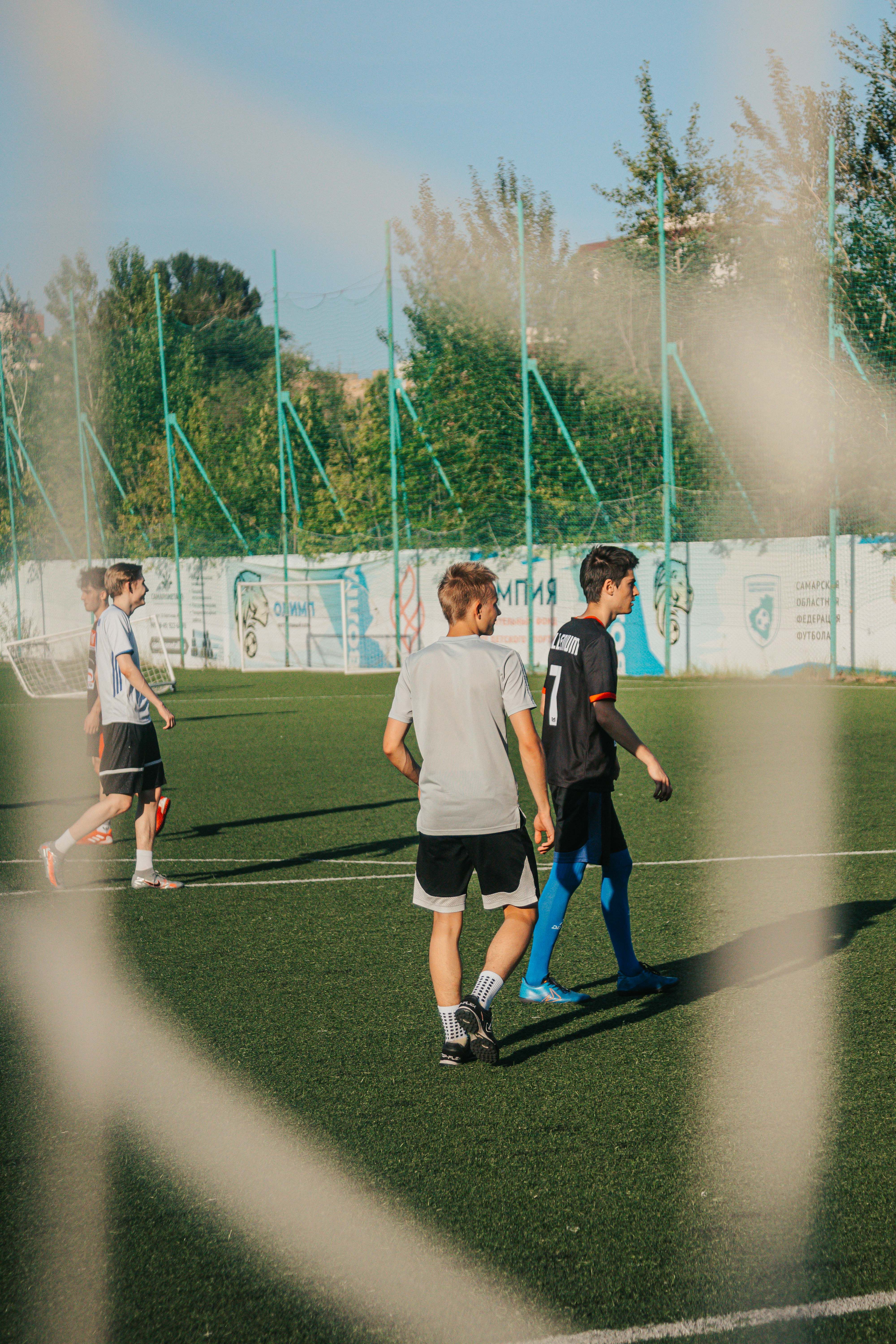 Man Playing on Football Pitch · Free Stock Photo