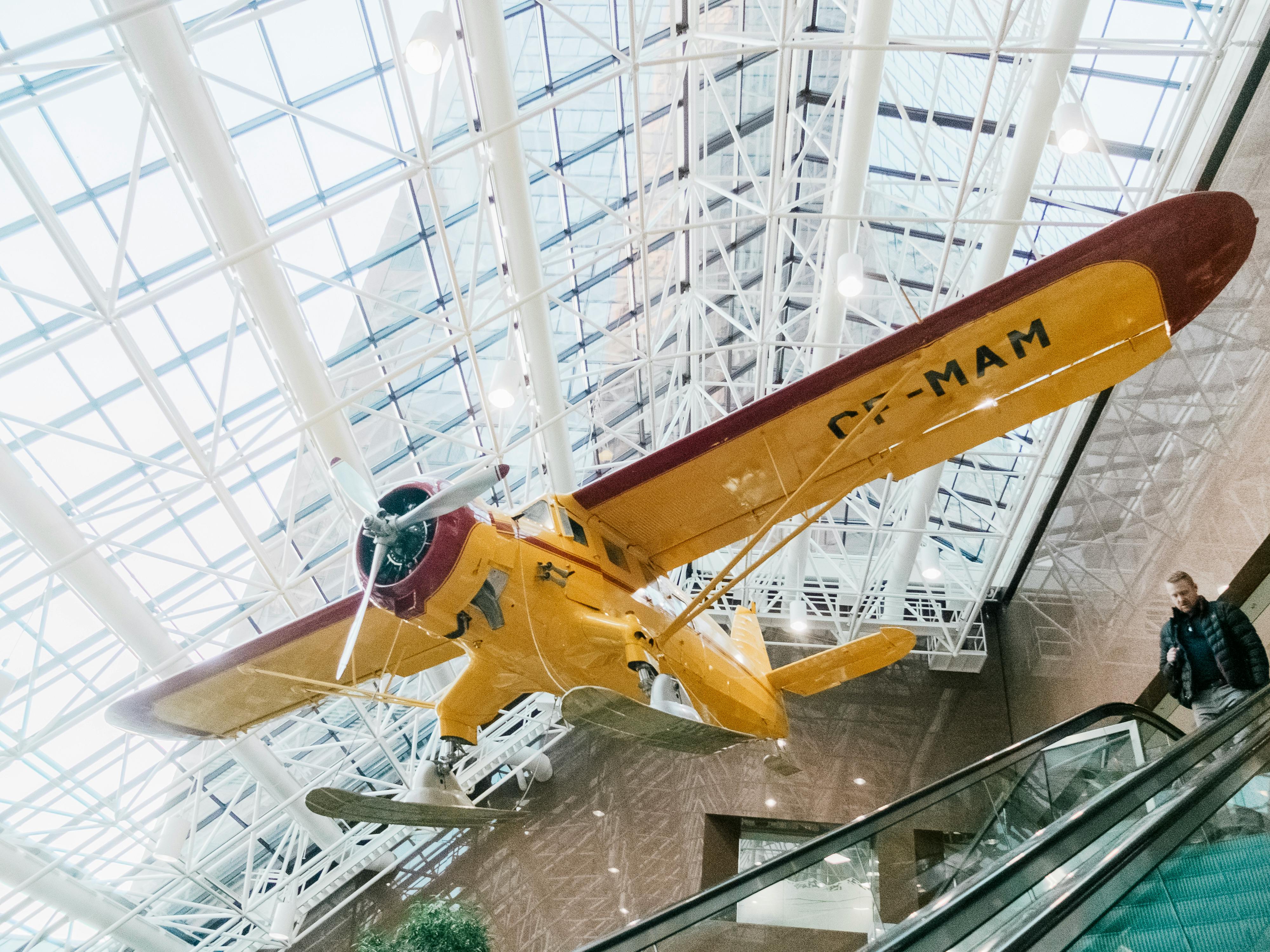 A Plane Hanging in the Interior of the Suncor Tower in Calgary, Alberta ...