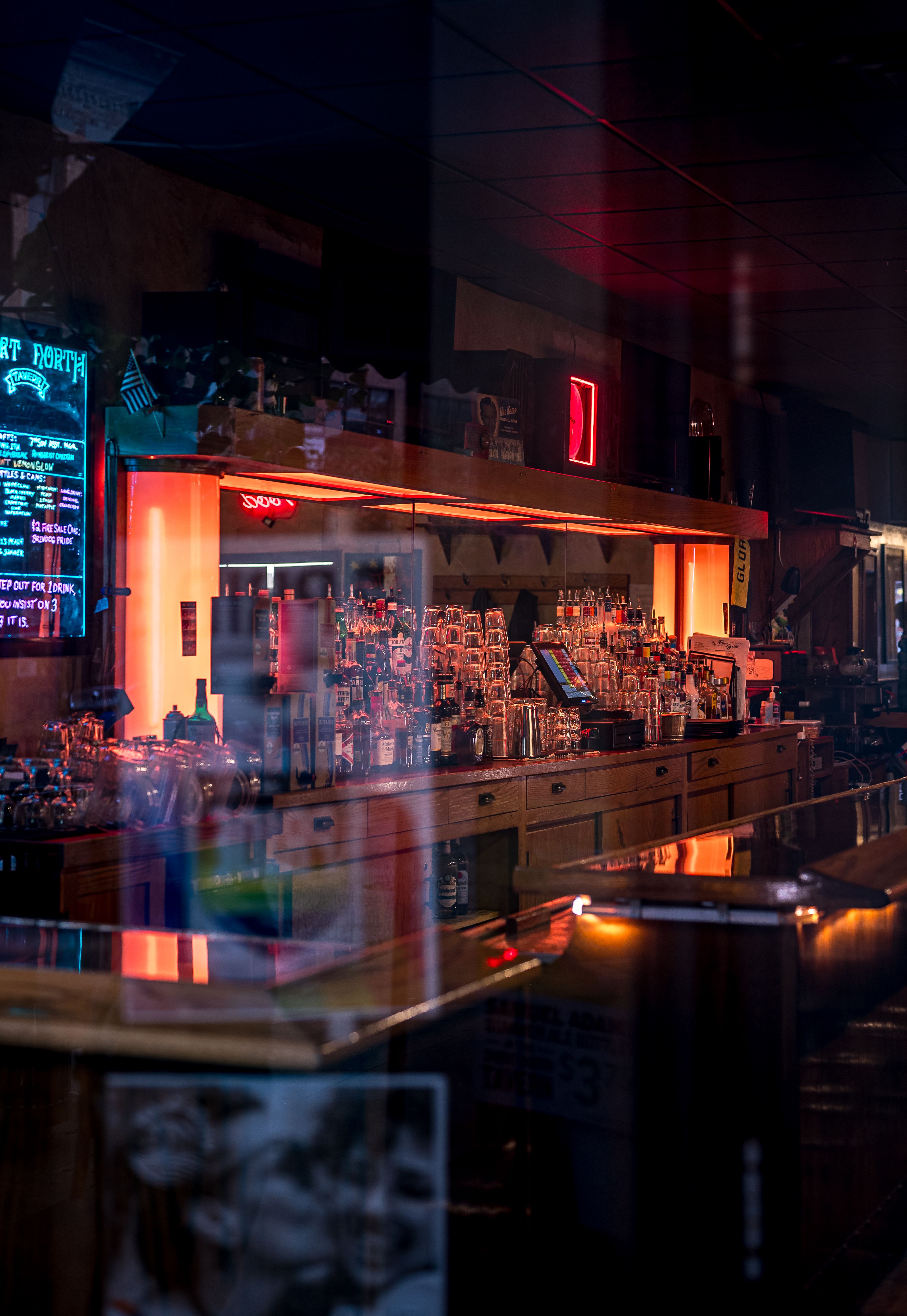 Interior of the Bar Seen Through the Window Glass · Free Stock Photo
