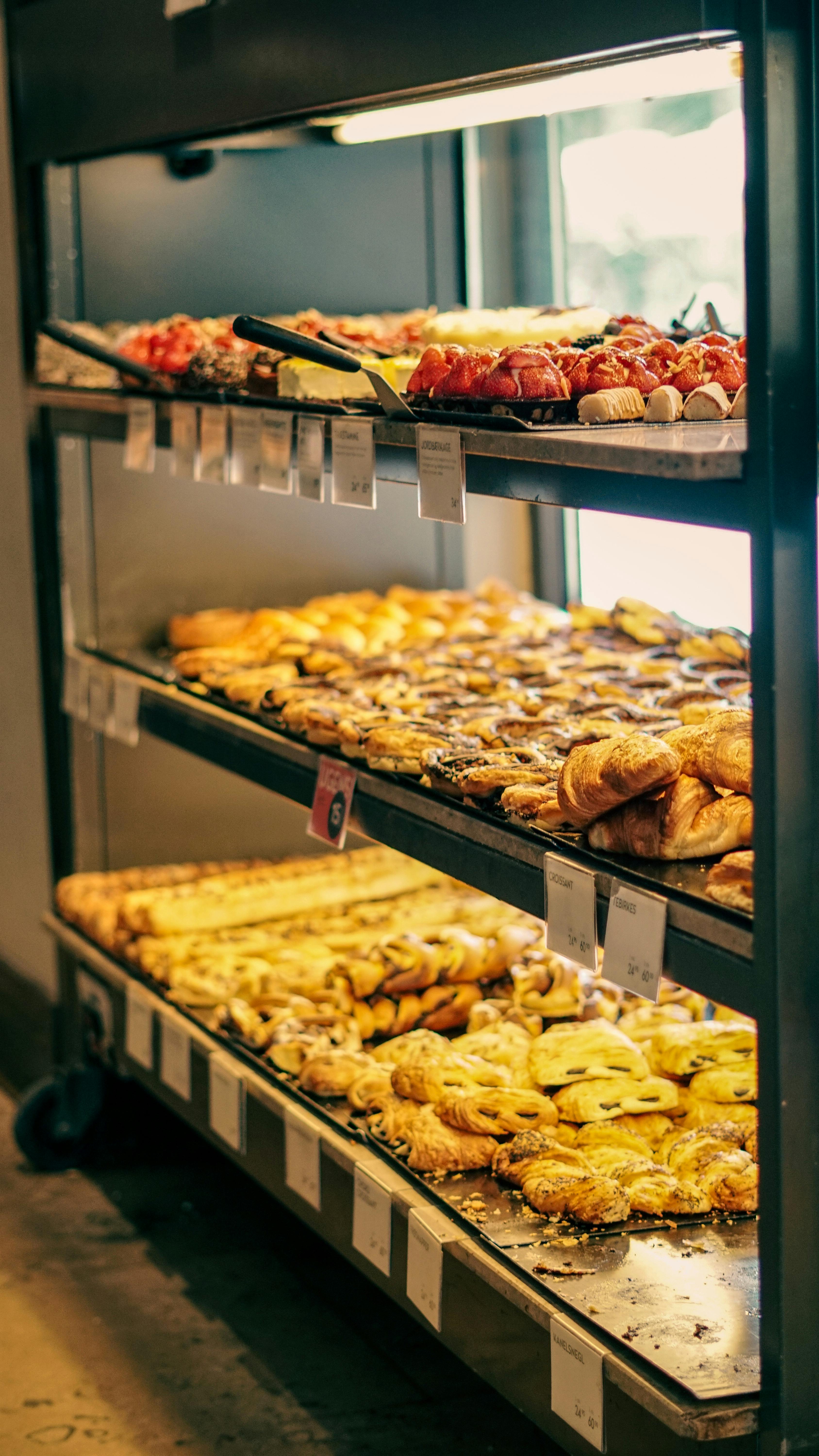 Trays Full of Cookies and Sweet Buns on a Trolley in a Bakery · Free ...