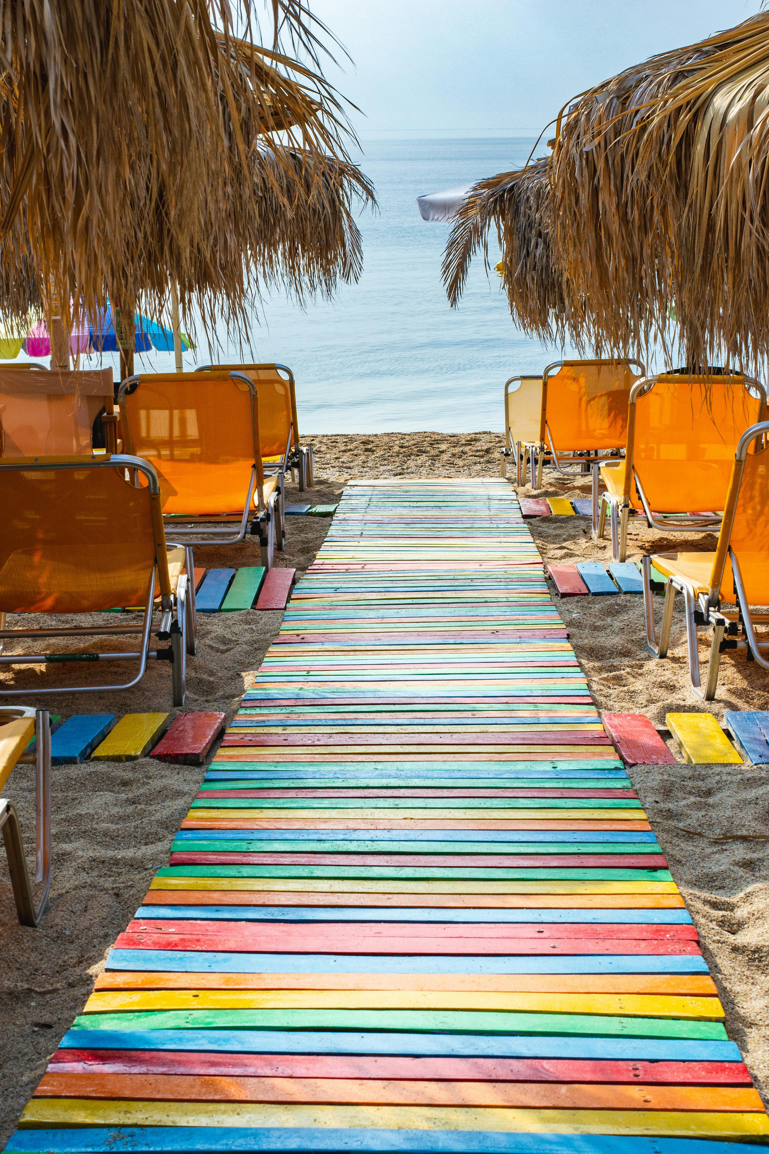 Colorful Path Leading Between Rows of Chairs · Free Stock Photo